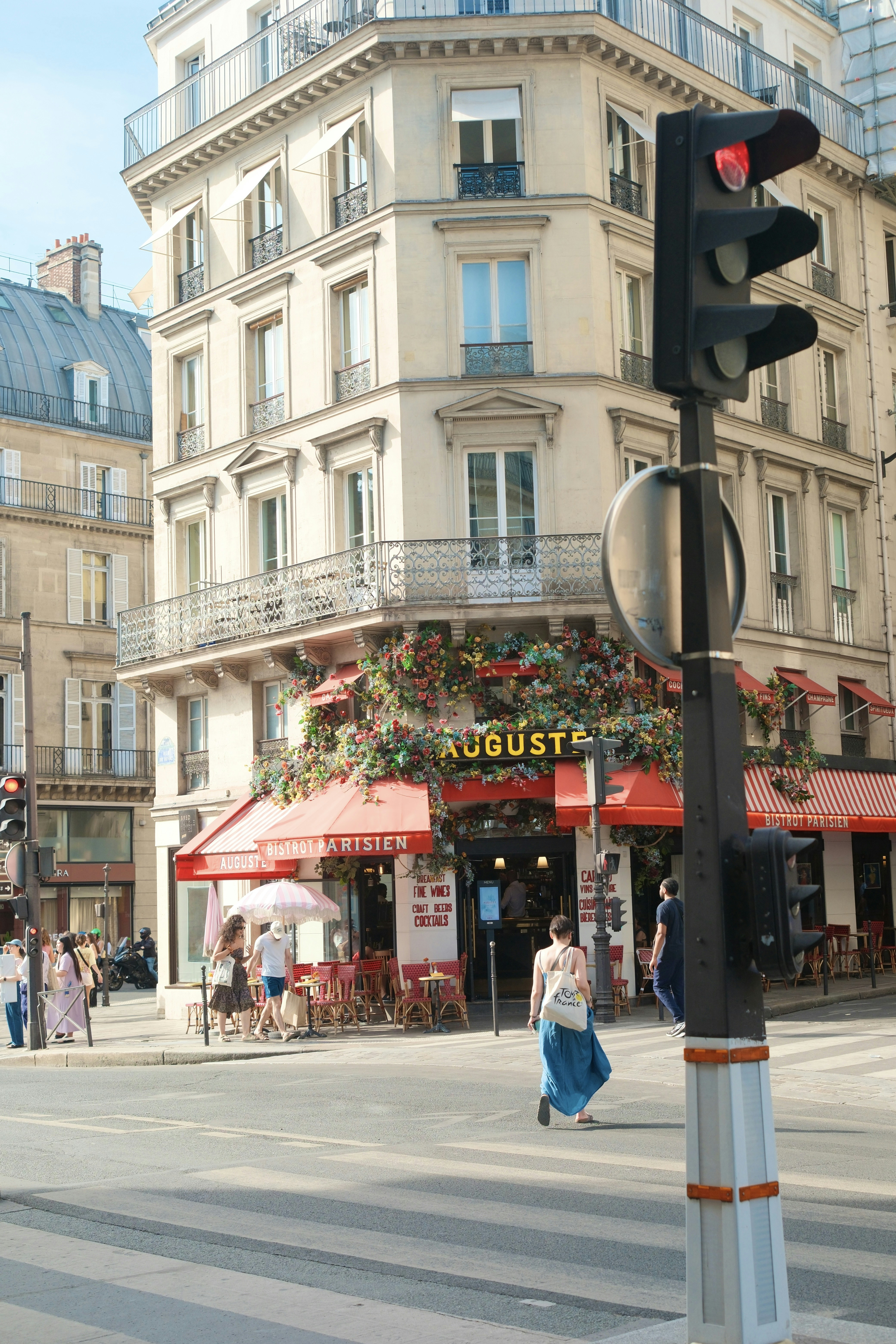 Cafe on the Corner: Parisian Charm Under Red Awnings