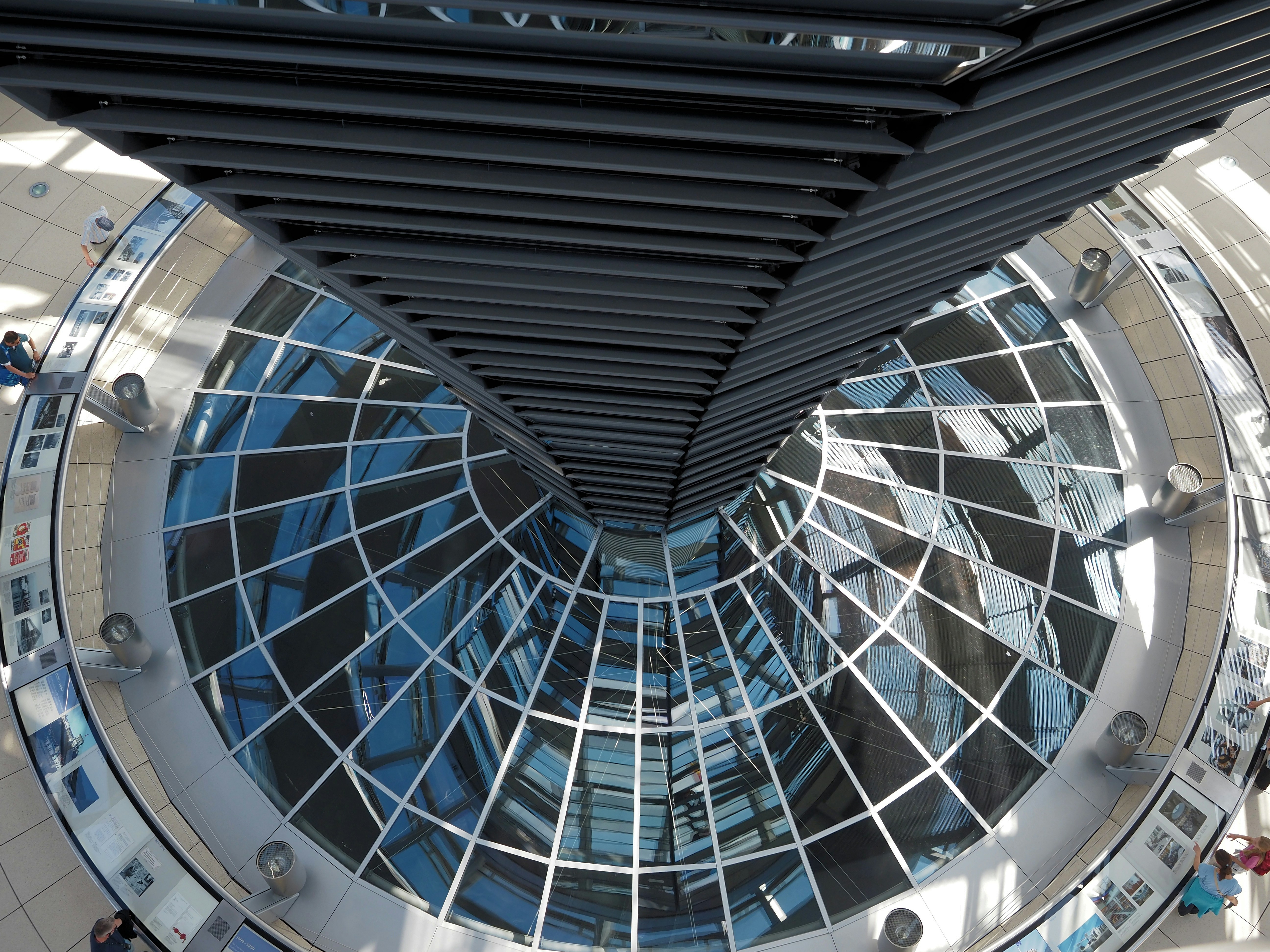 Spoked Atrium: A Helical View Through the Sky-Cooled Glass