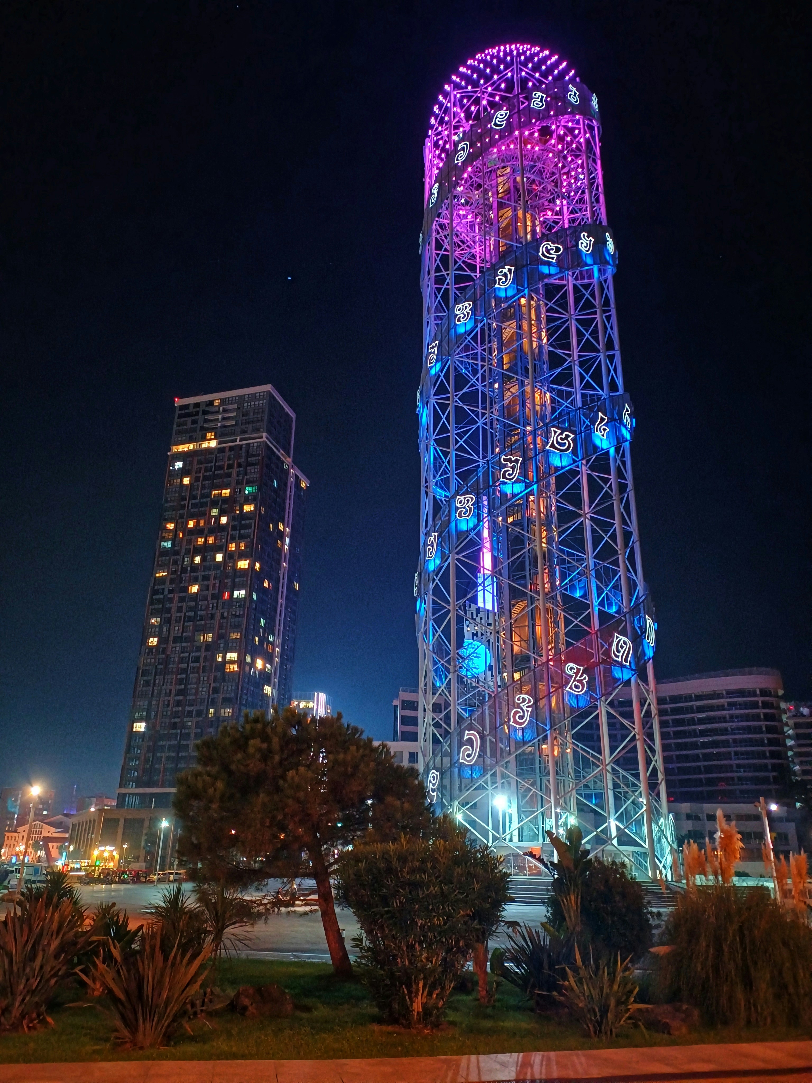 Neon Skyline Tower: A Night of Luminous Lattice