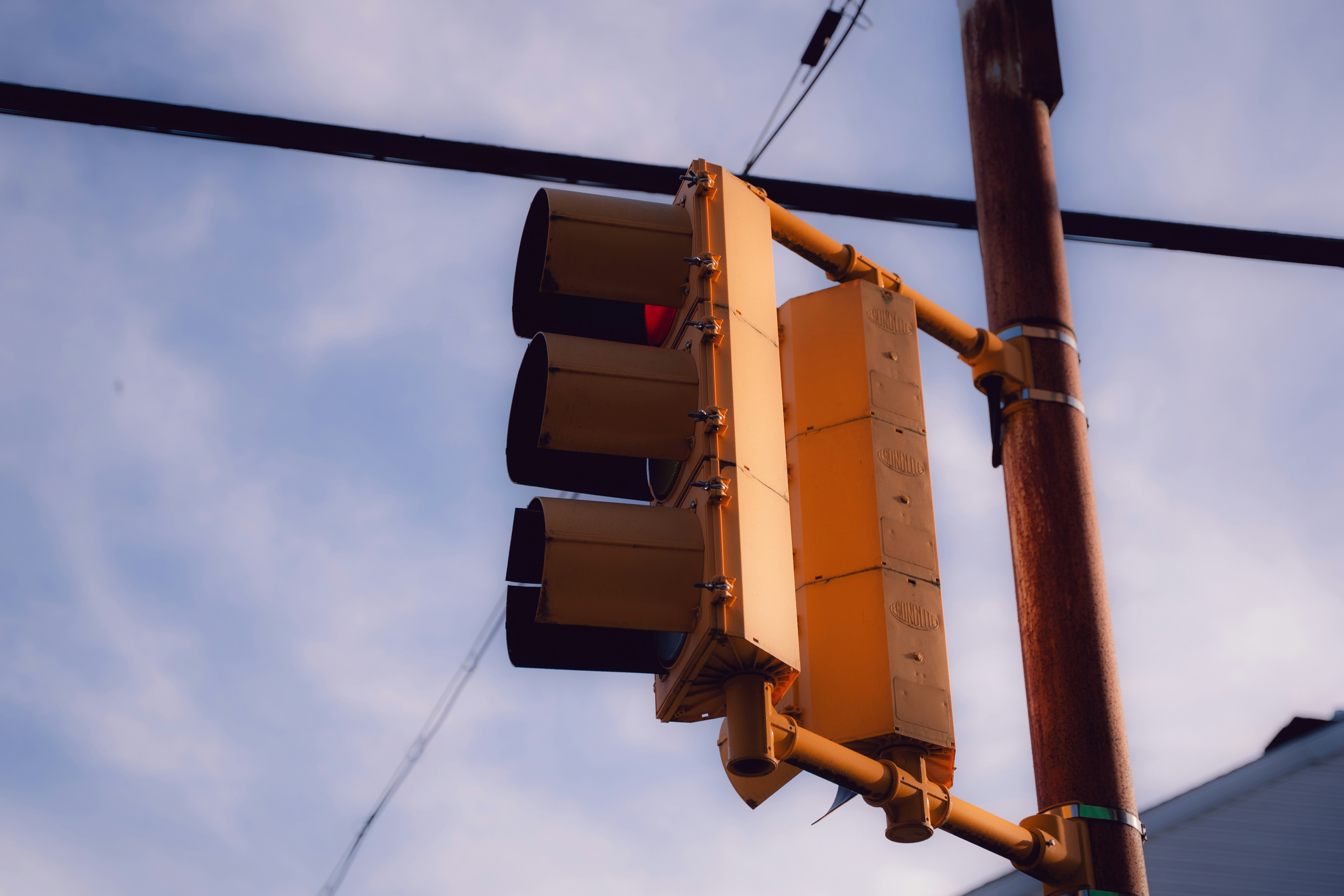 Golden Hour Signal: A Streetlight Taxiing into the Sky