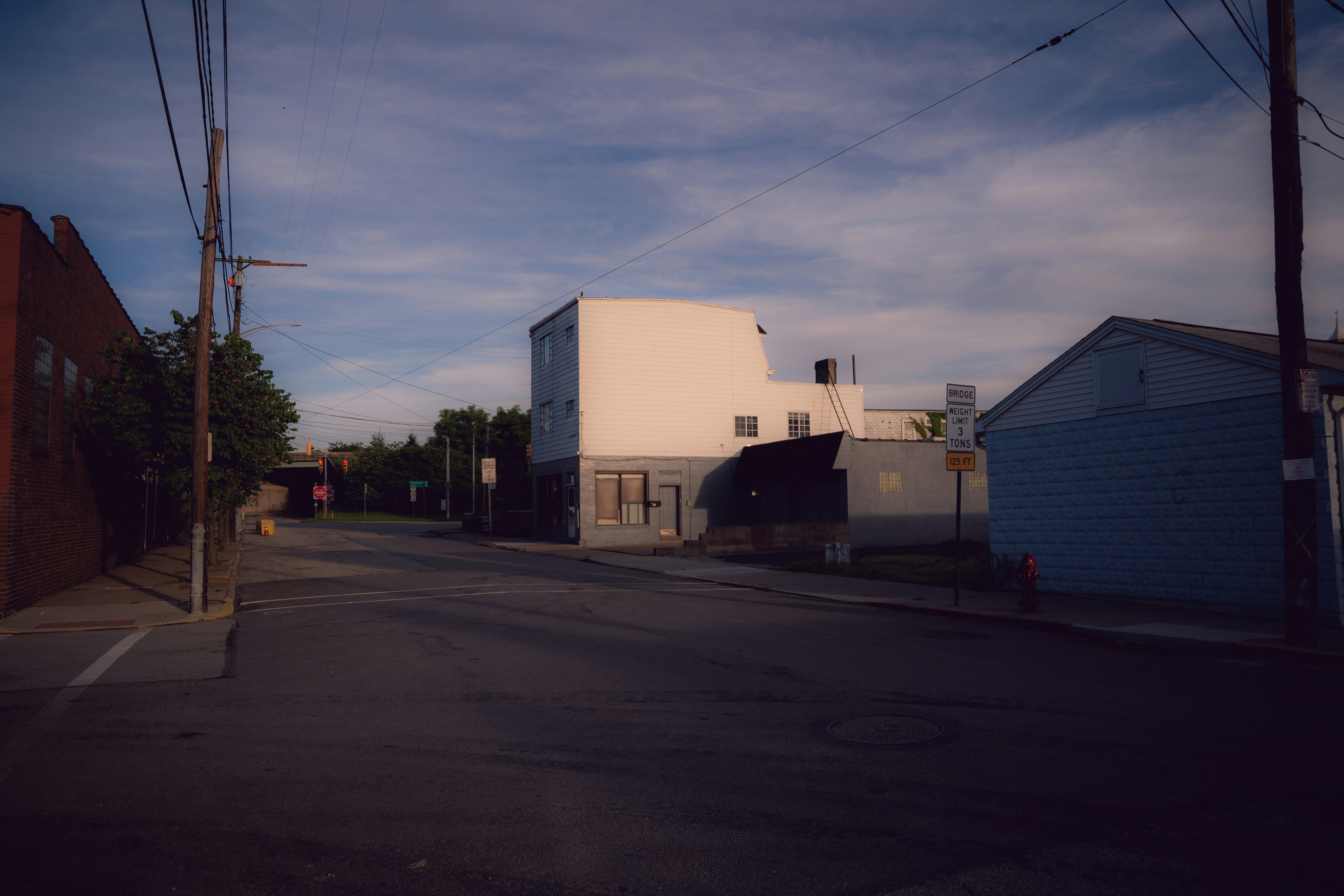Quiet Main Street Beneath a Wide Blue Sky