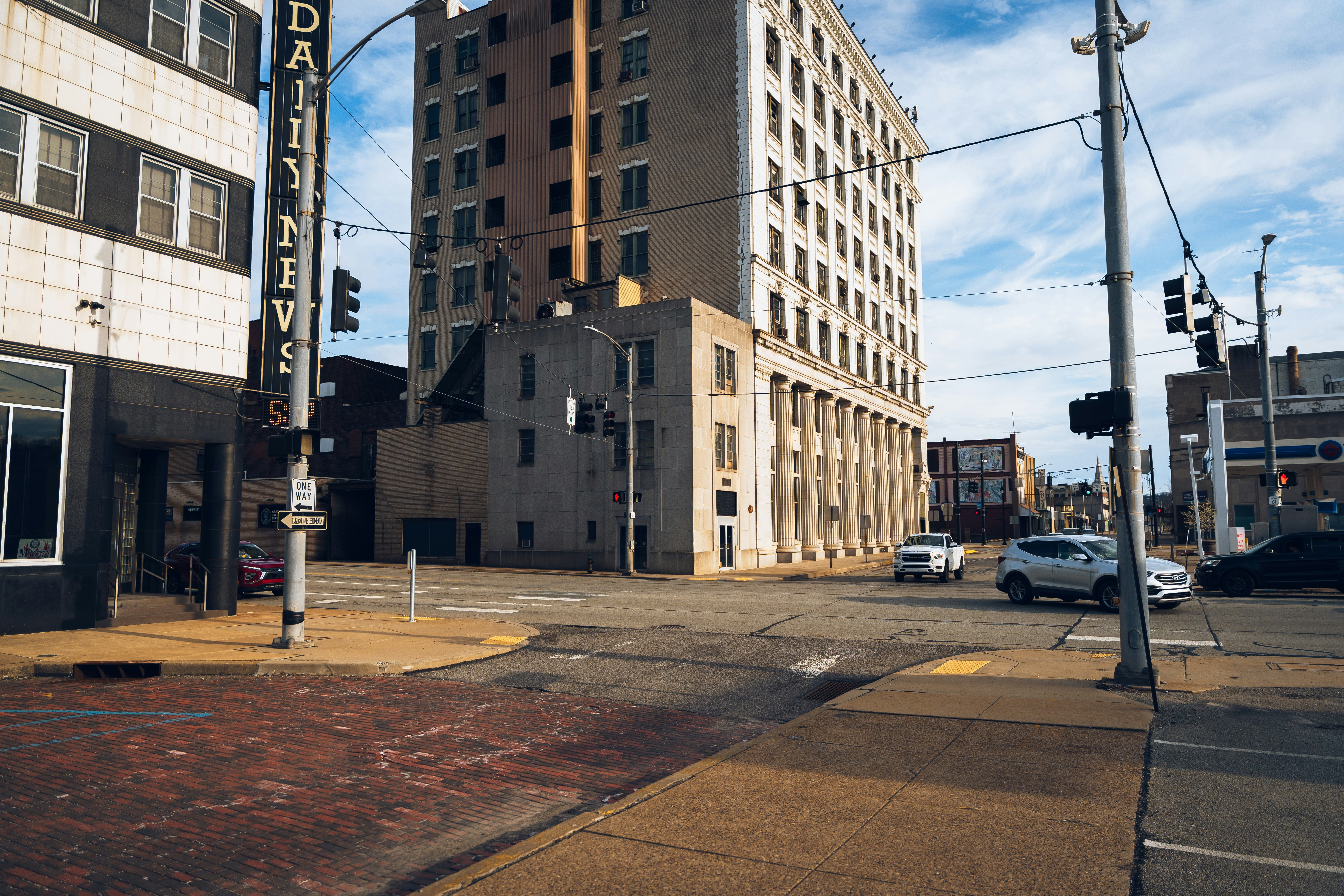 Urban Concrete Confluence: Street Corner with Tall Building Axes