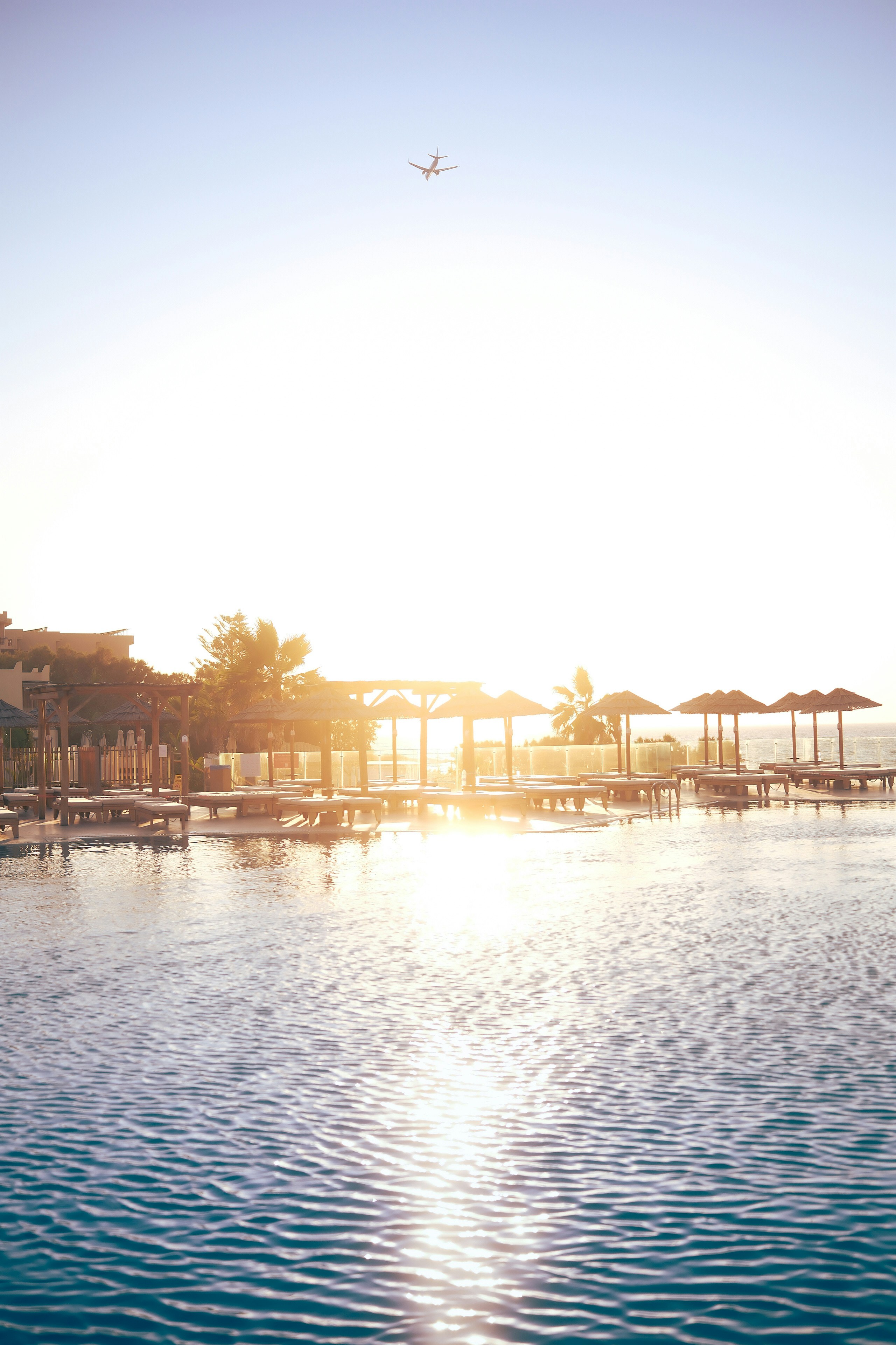Sunlit Poolside: A Quiet Moment Under the Endless Sky