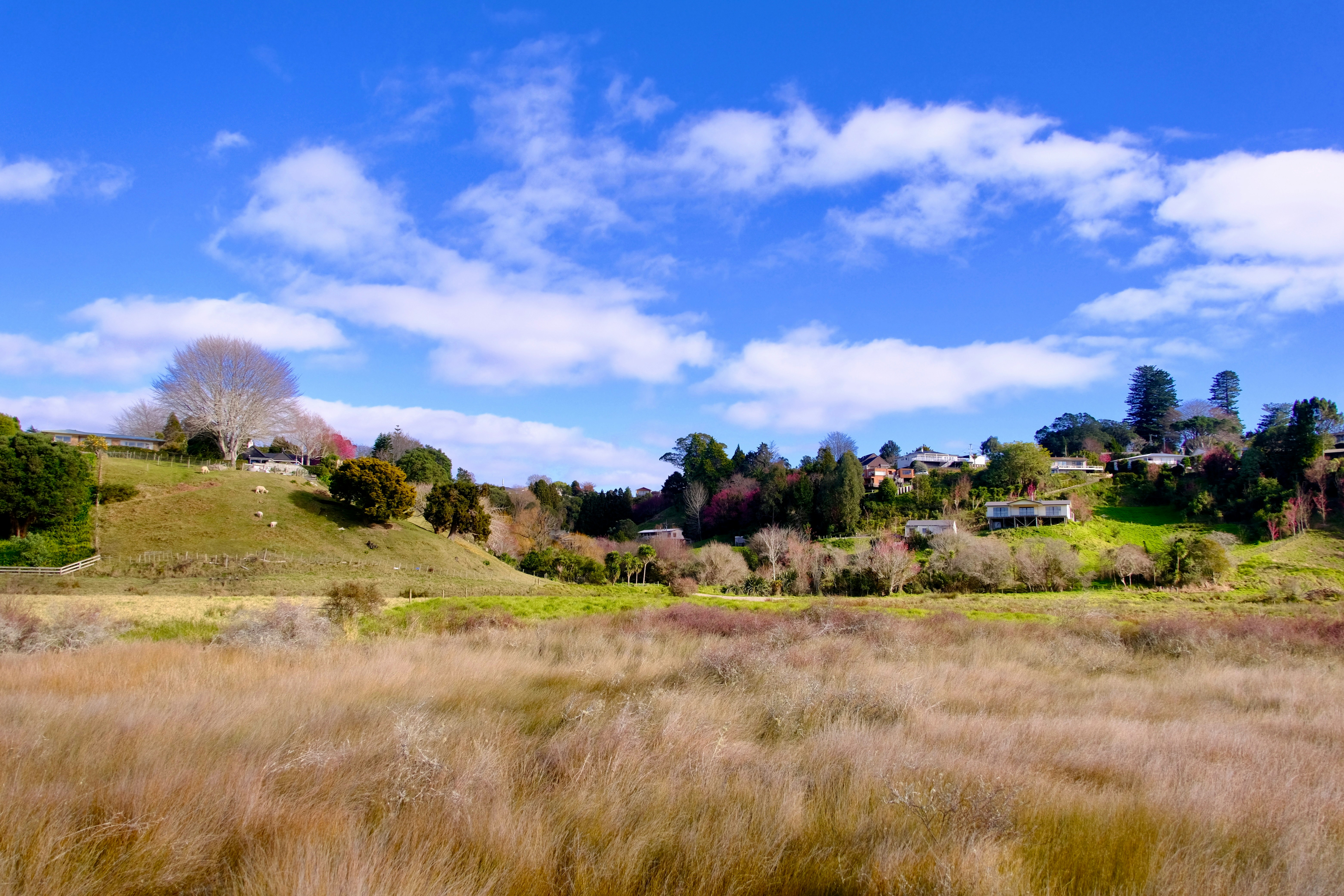 Hillside Hamlets under a Bright Plateau Sky