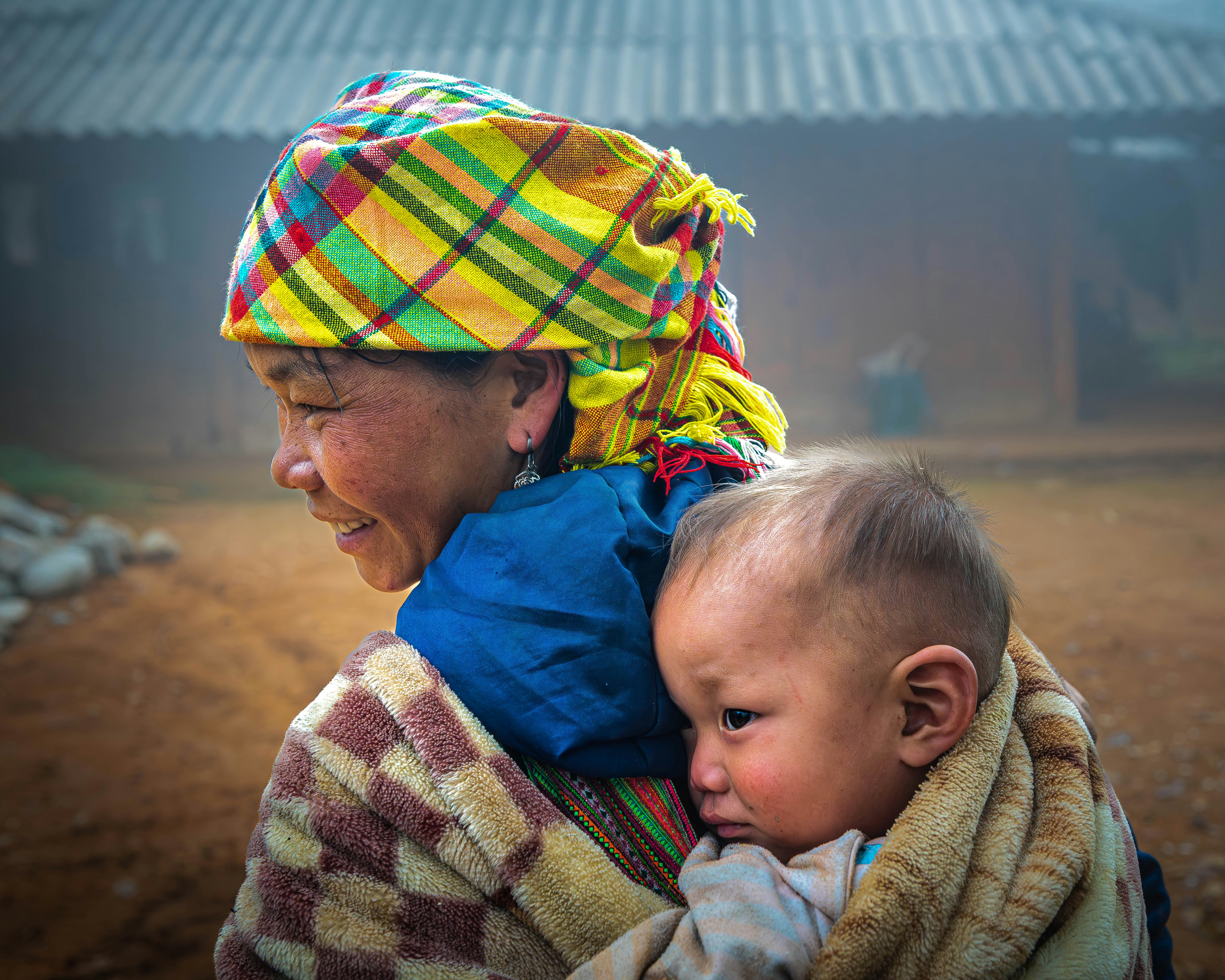 Holdfast in Turbulent Dawn: A Mother and Child on a Quiet Verge