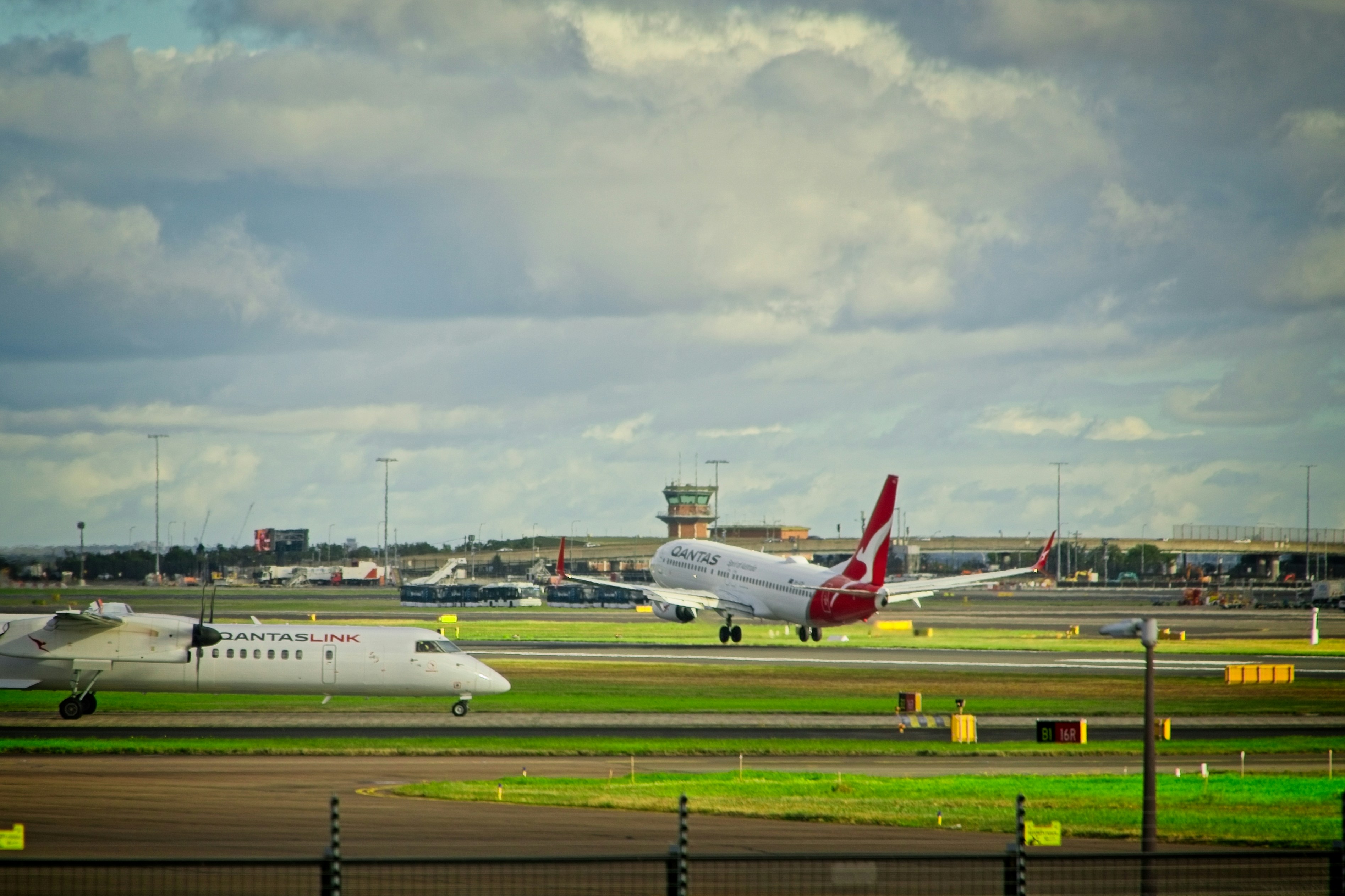 Taxiing Quiet Giants: A Dual Runway Scene at Dusk