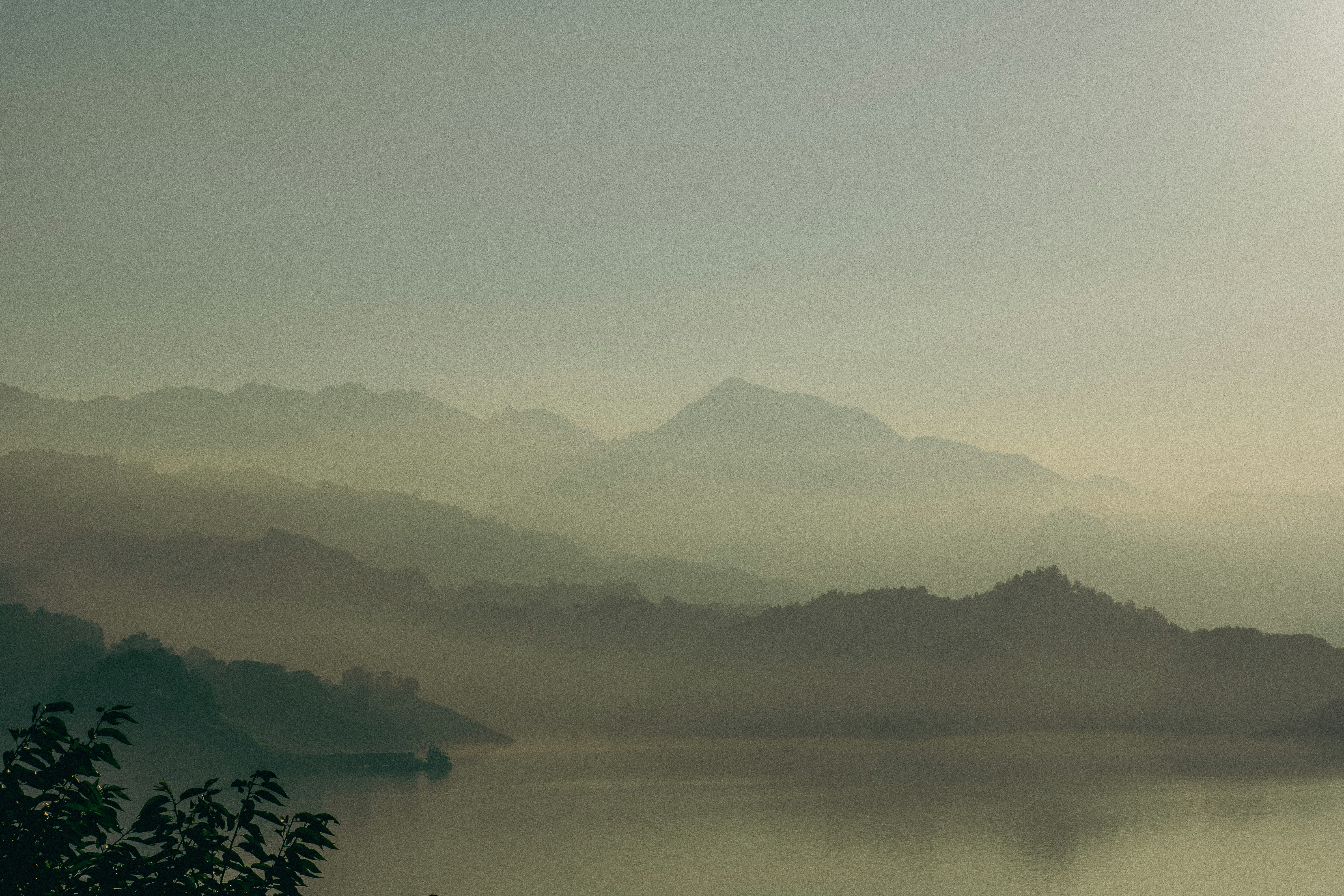 Mist-kissed Vistas over Quiet Waters