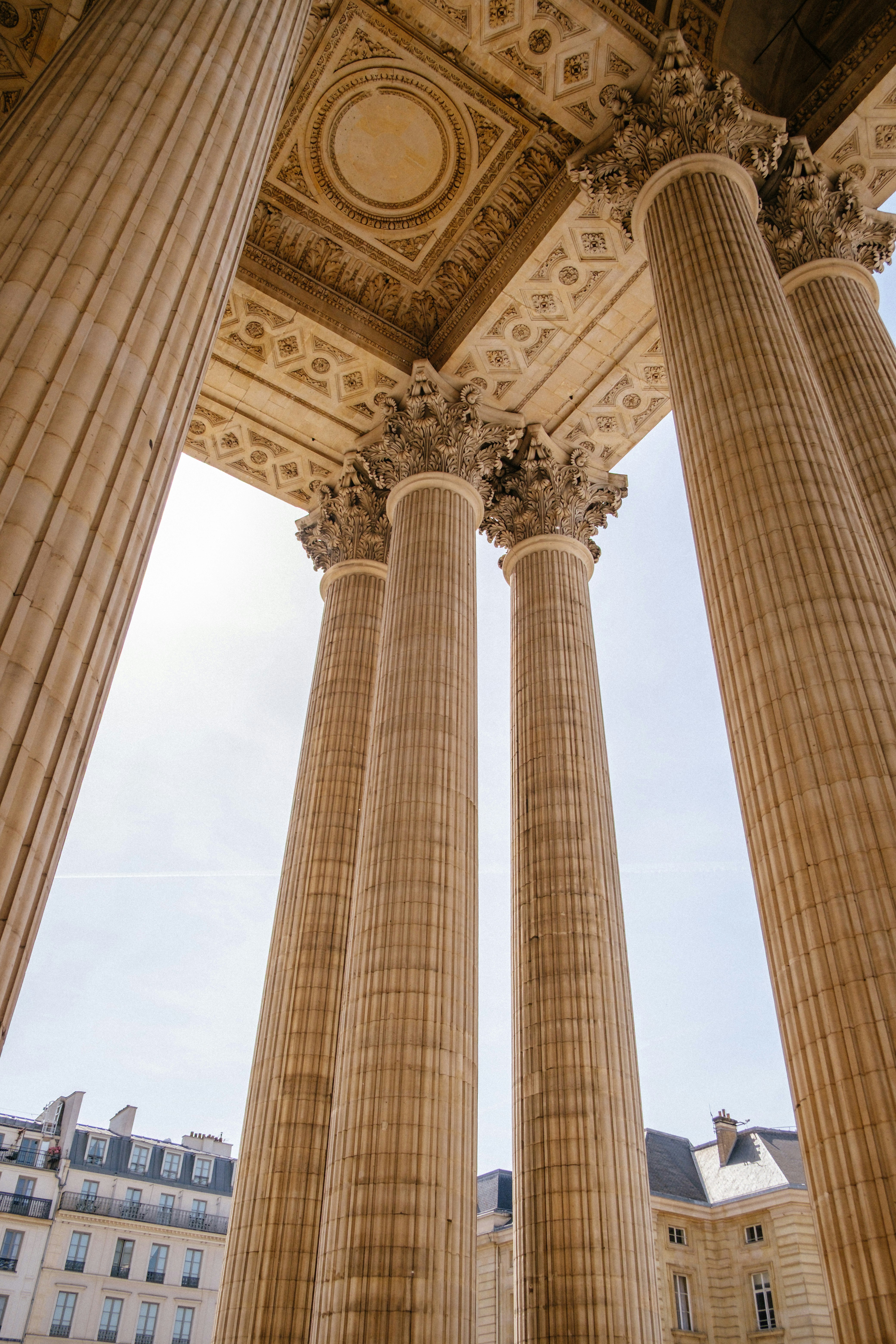 Colossal Columns Under an Ornate Coffered Arch