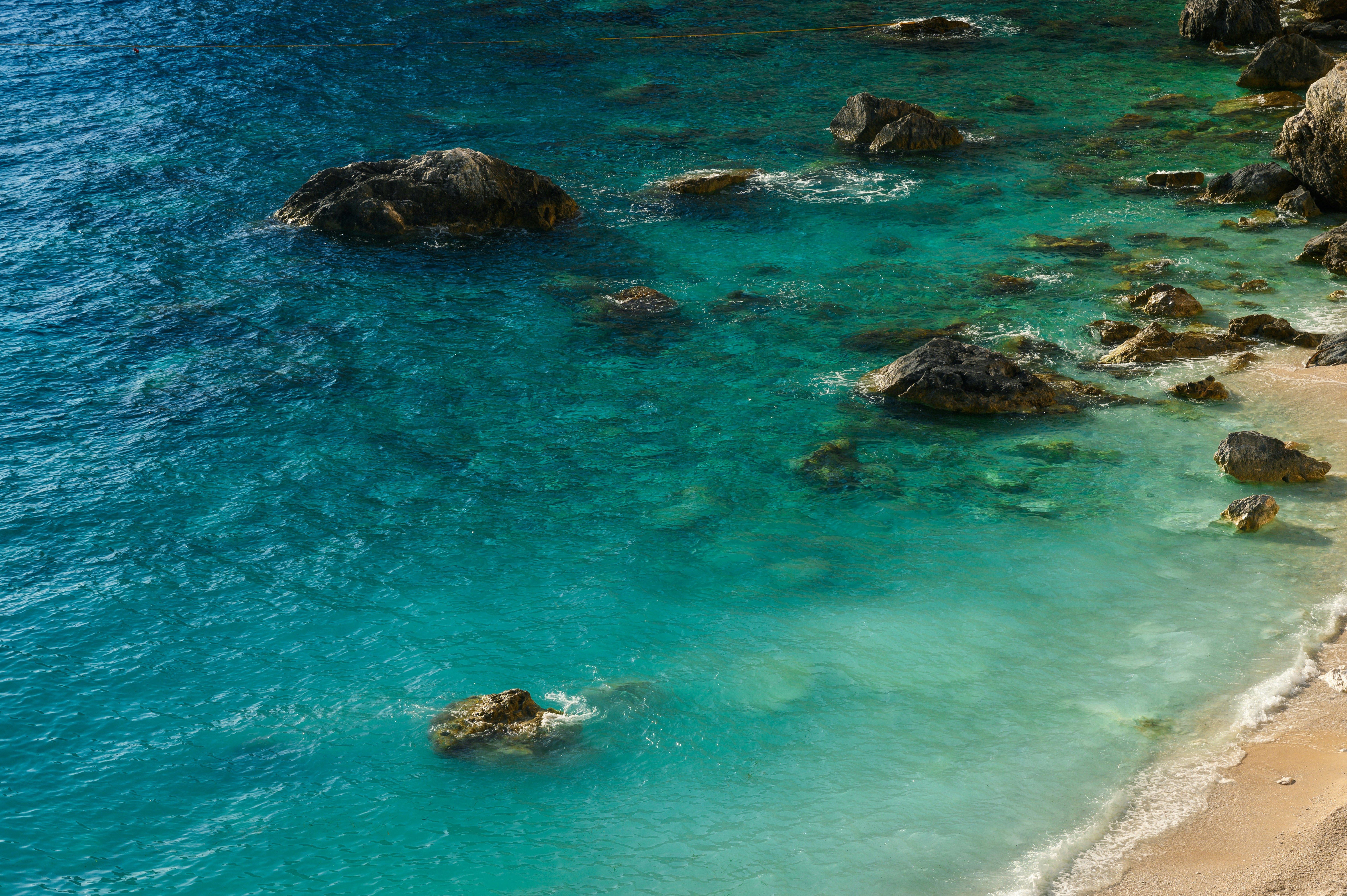 Turquoise Coastline: Clear Waters Meet Golden Sand