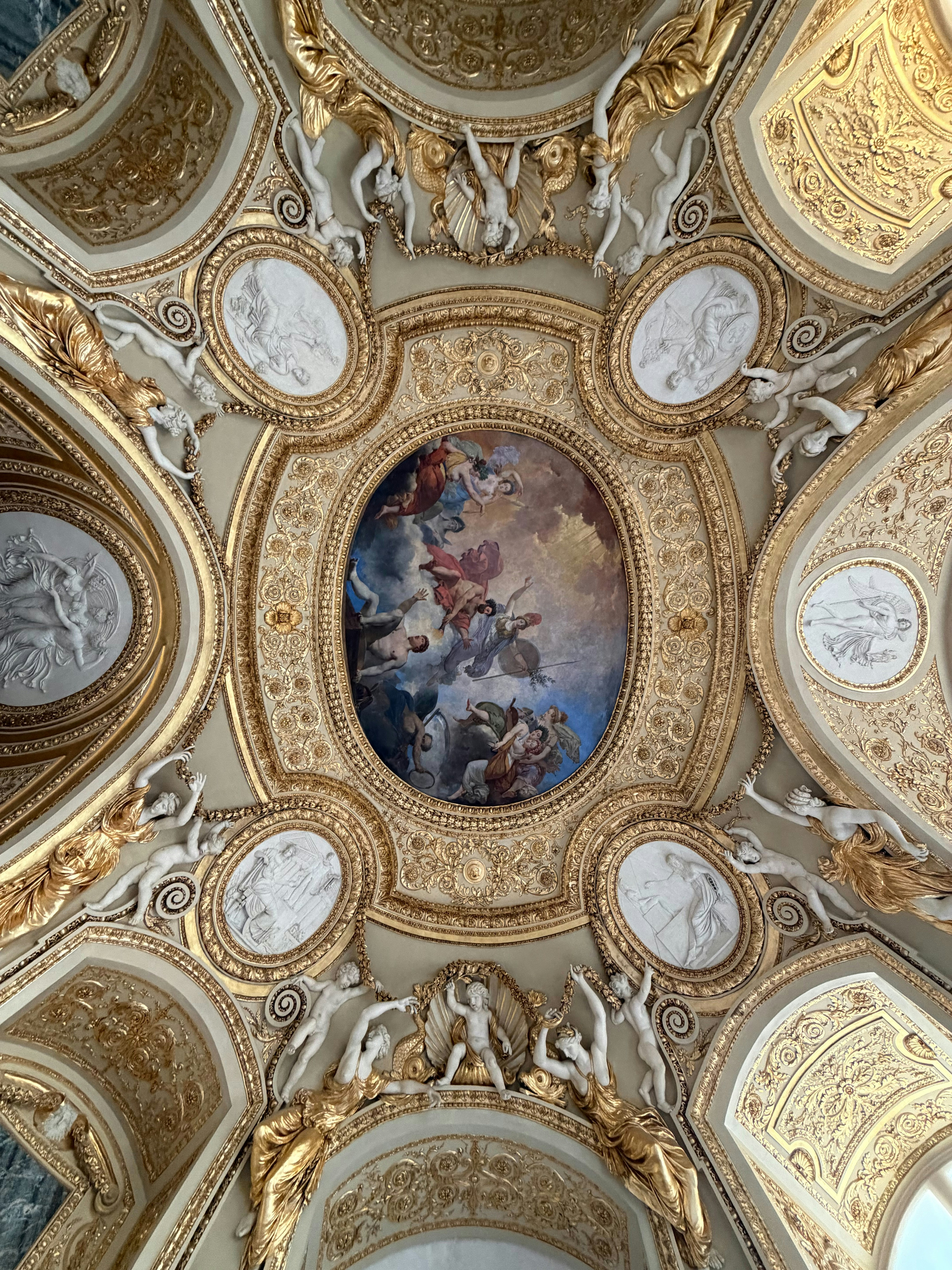 Baroque Ceiling: Gold Leaf Ornaments Framing a Central Fresco