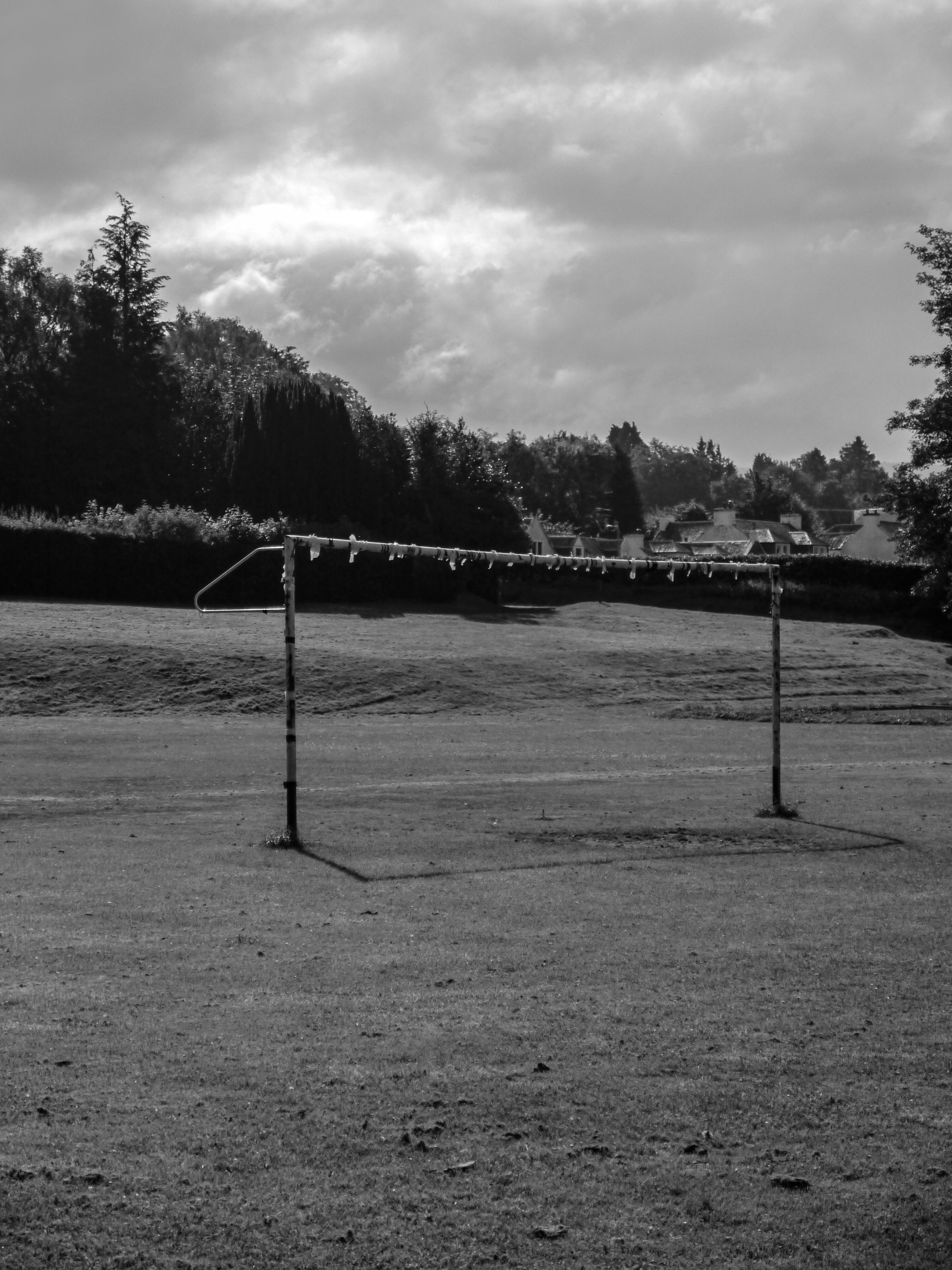 Muted Playground Lines Under a Distant Sky