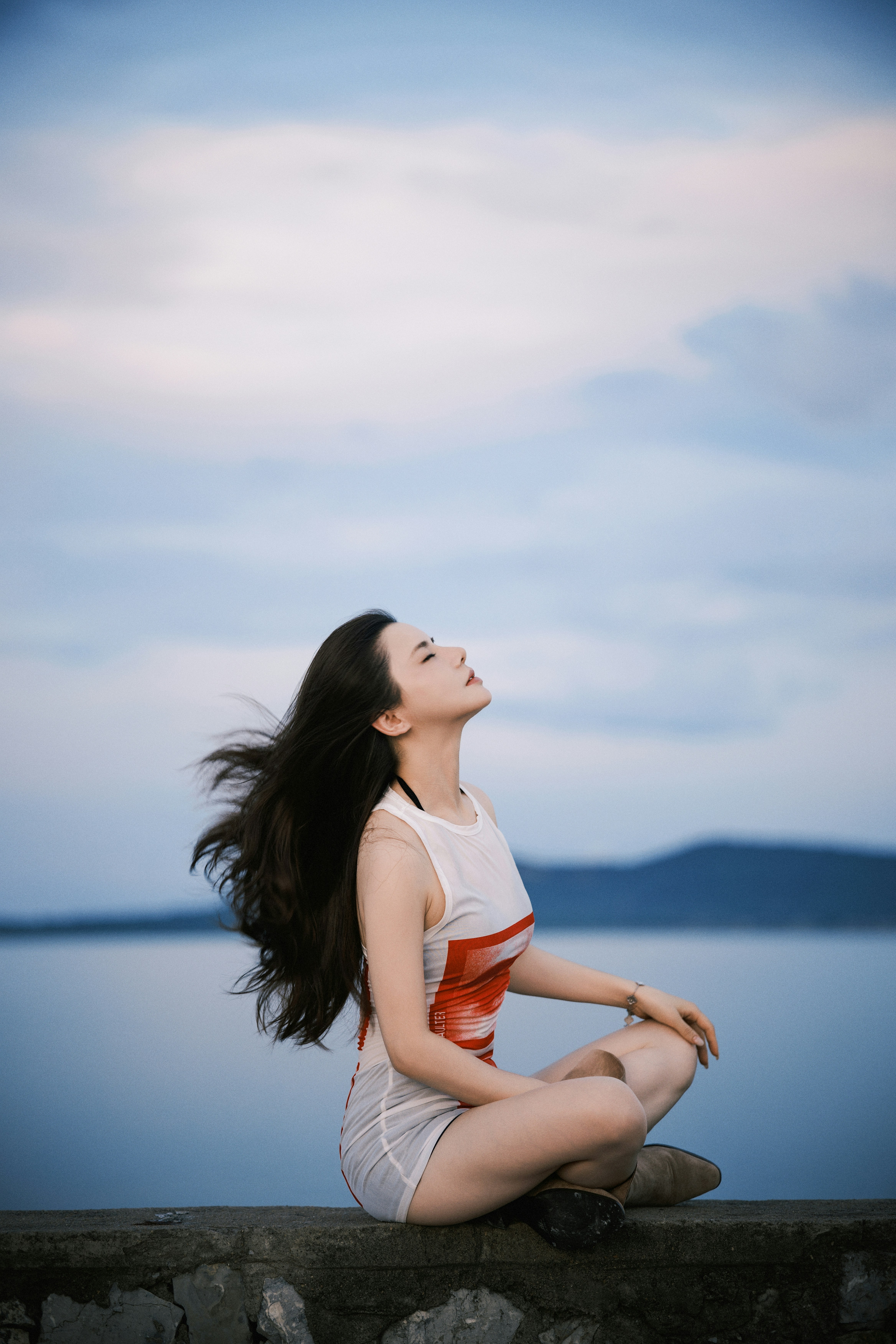 Stillness at the Water's Edge: A Quiet Portrait by the Sea