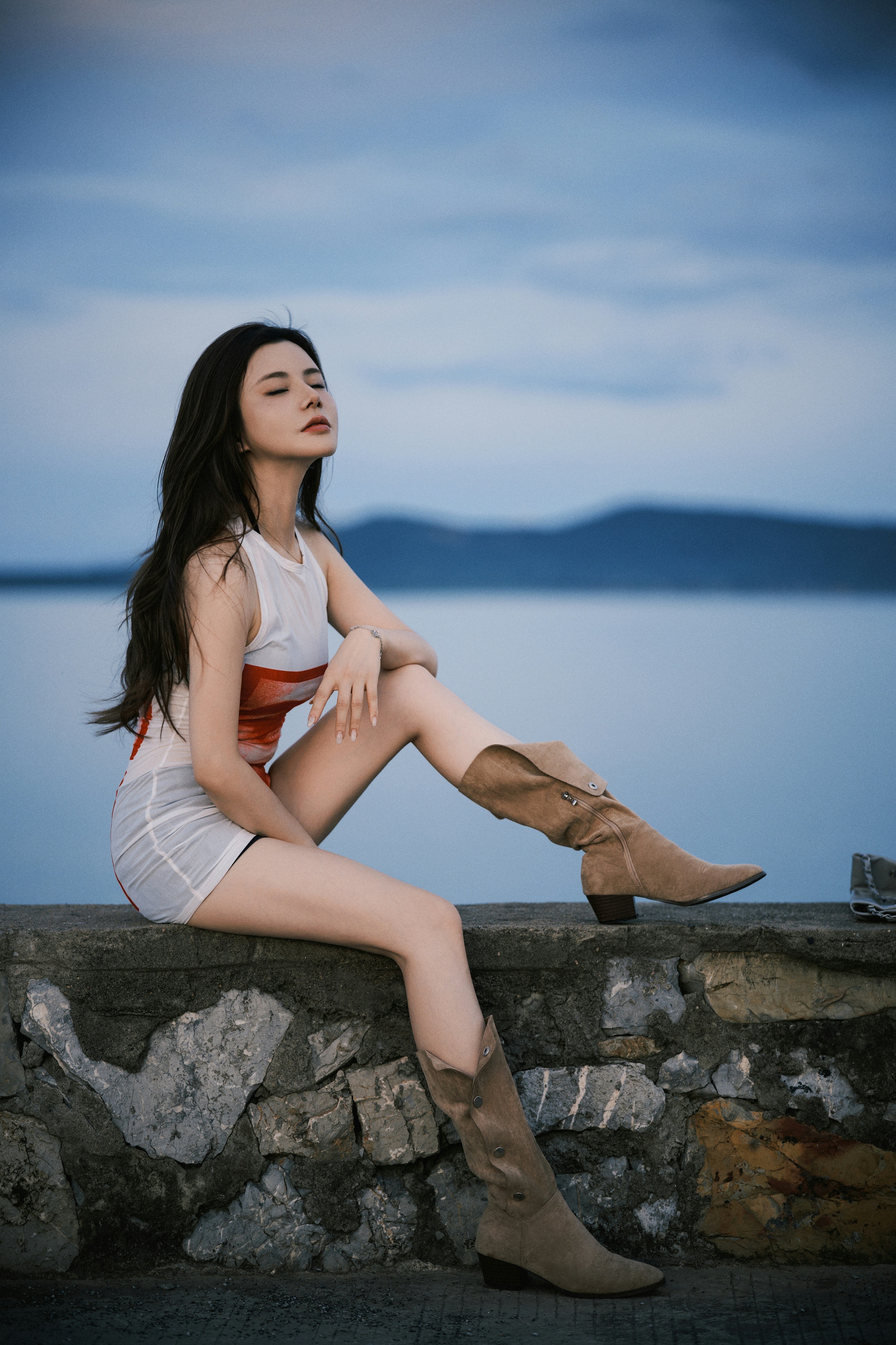 Seated on the Sea Wall: Quiet Confidence by the Water