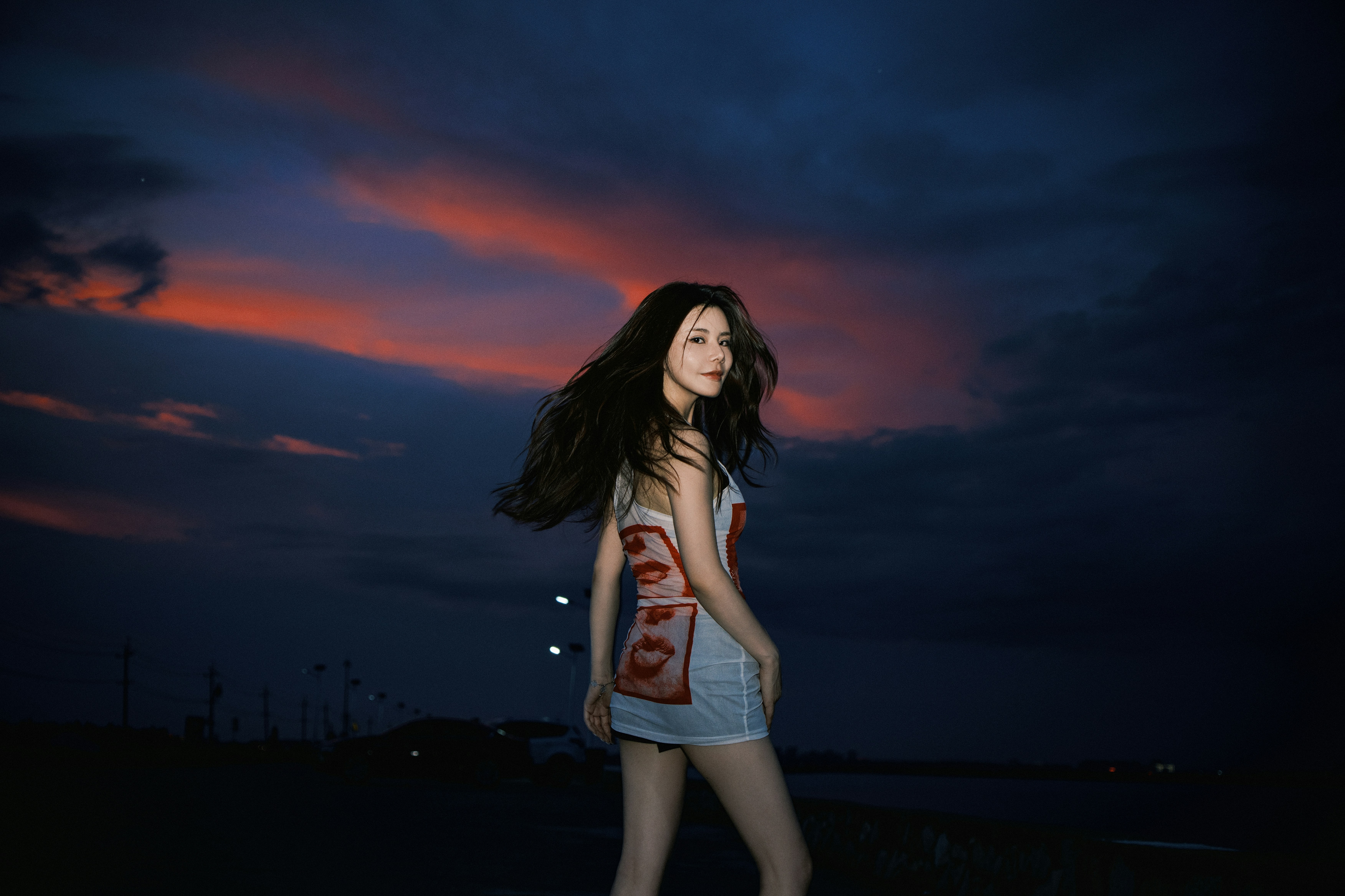Neon-lit Maiden: Portrait on the Dusk Seashore