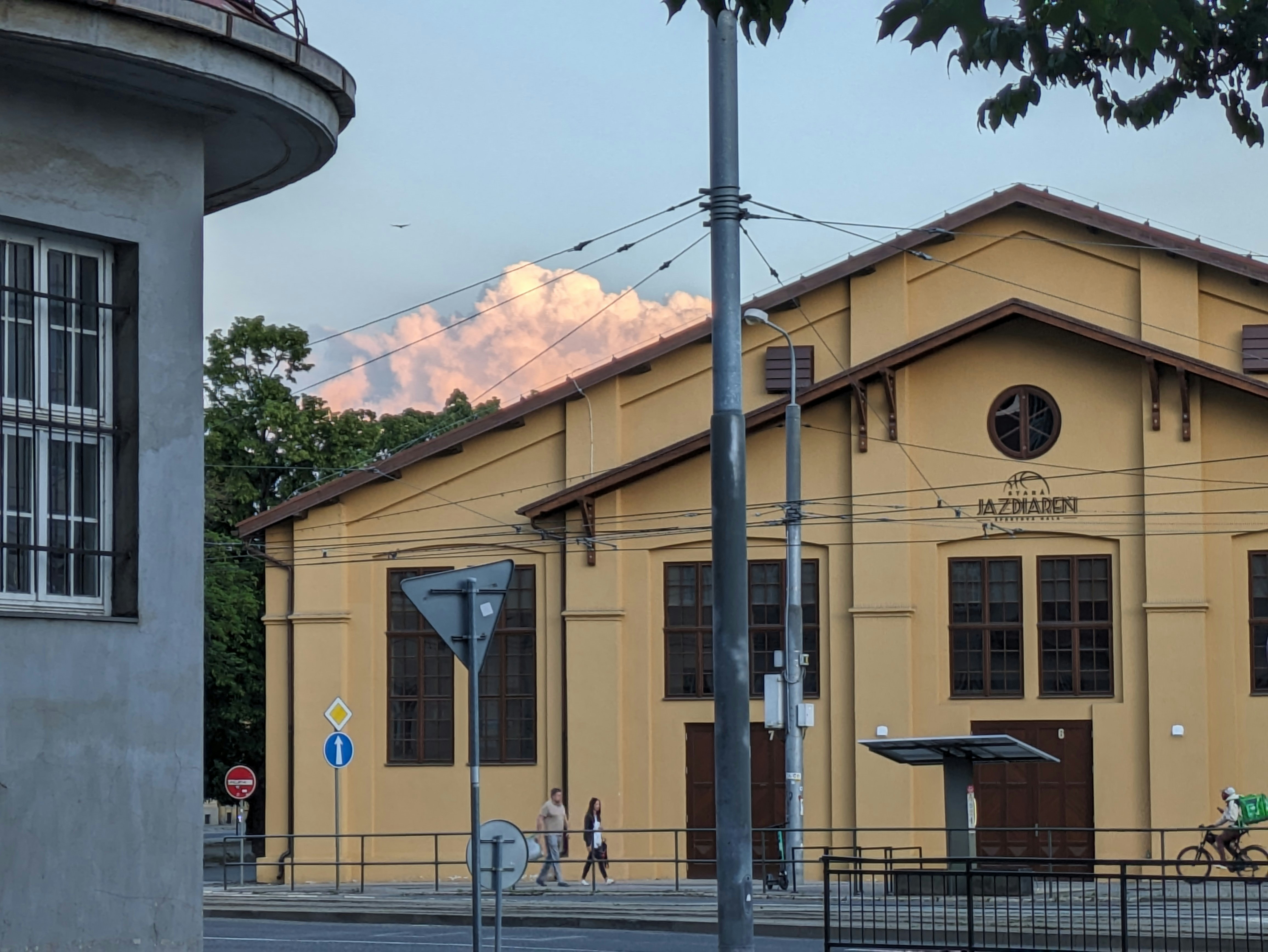 Yellow Warehouse Meets Quiet Street at Dusk