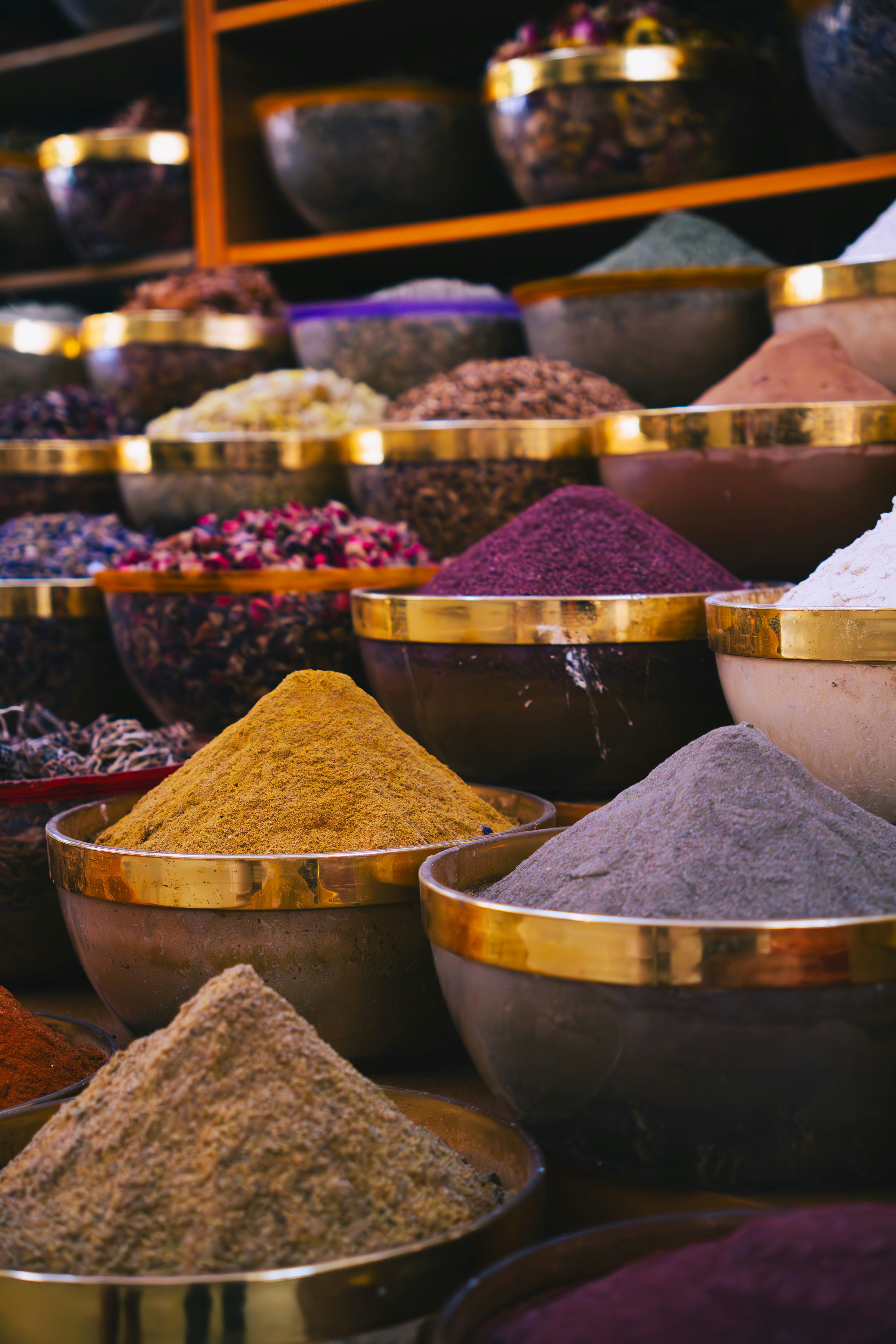 Colorful Spice Towers: A Market Bowl of Ground Hues
