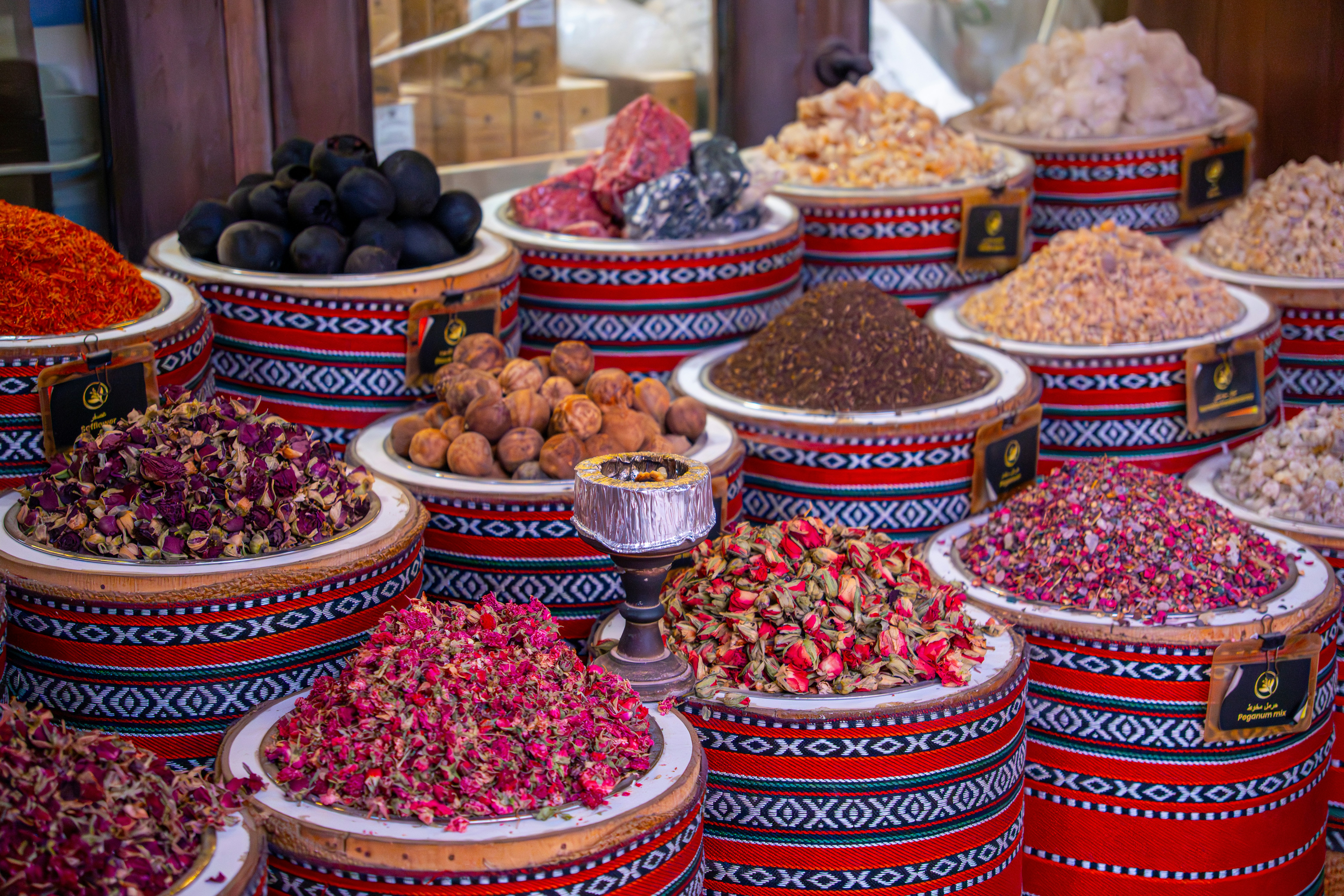 Heap of Spiced Bites: Colorful Granules in a Market Stall