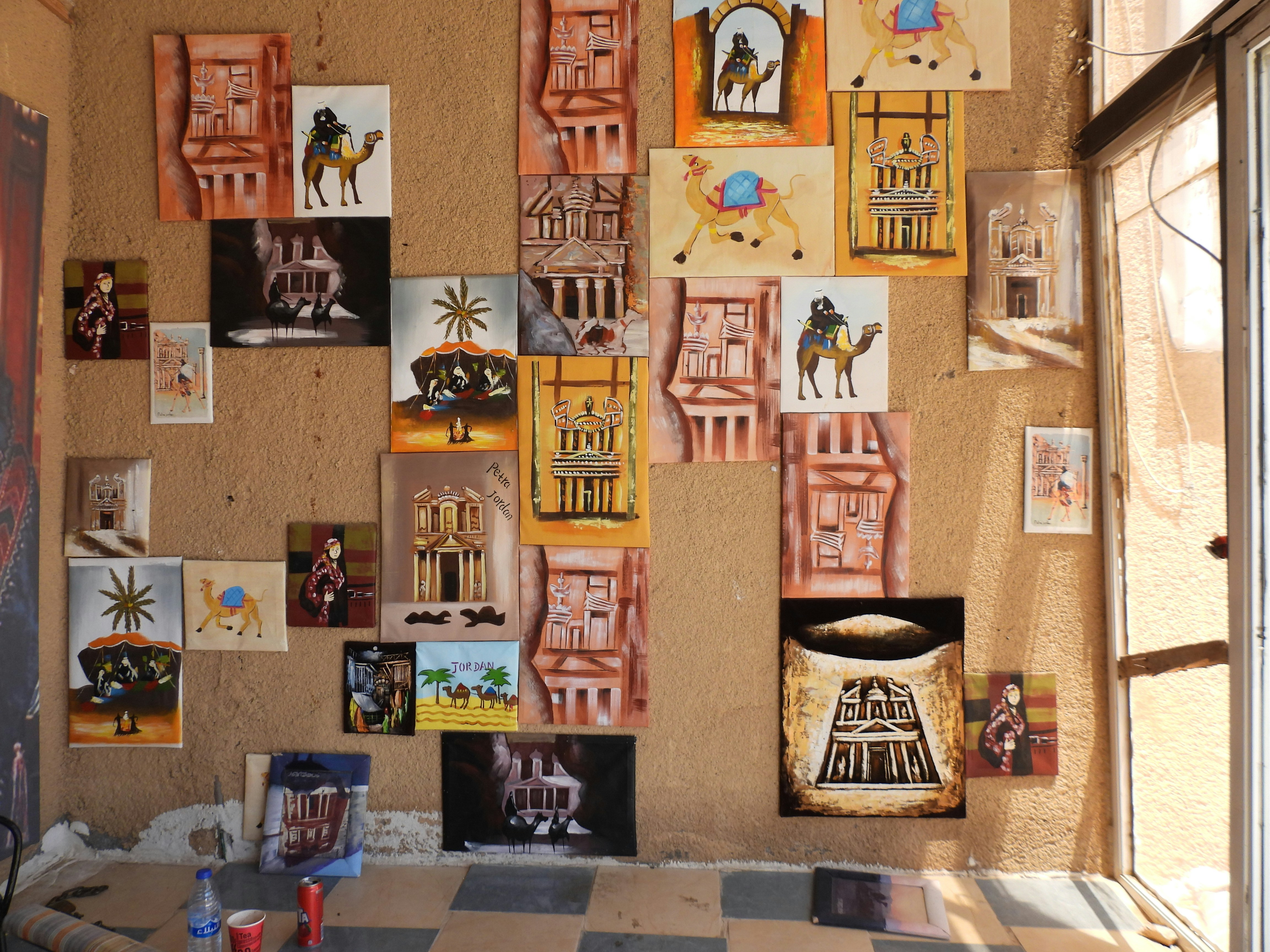 Patchwork of Ports: Cards, Doors, and Miniatures on a Sunlit Wall