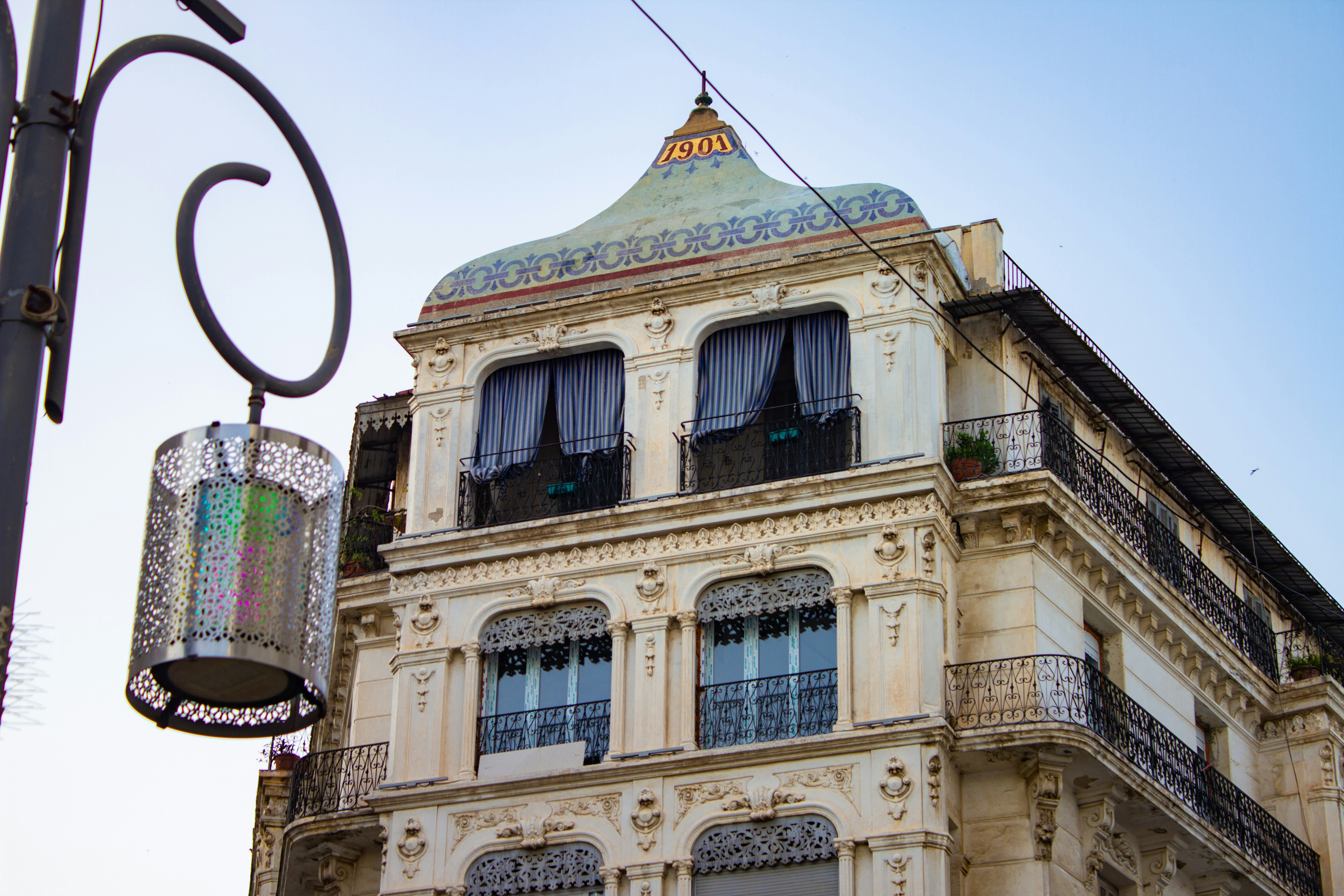 Ornate Facade Overlook: a Corner Balcony and Lantern