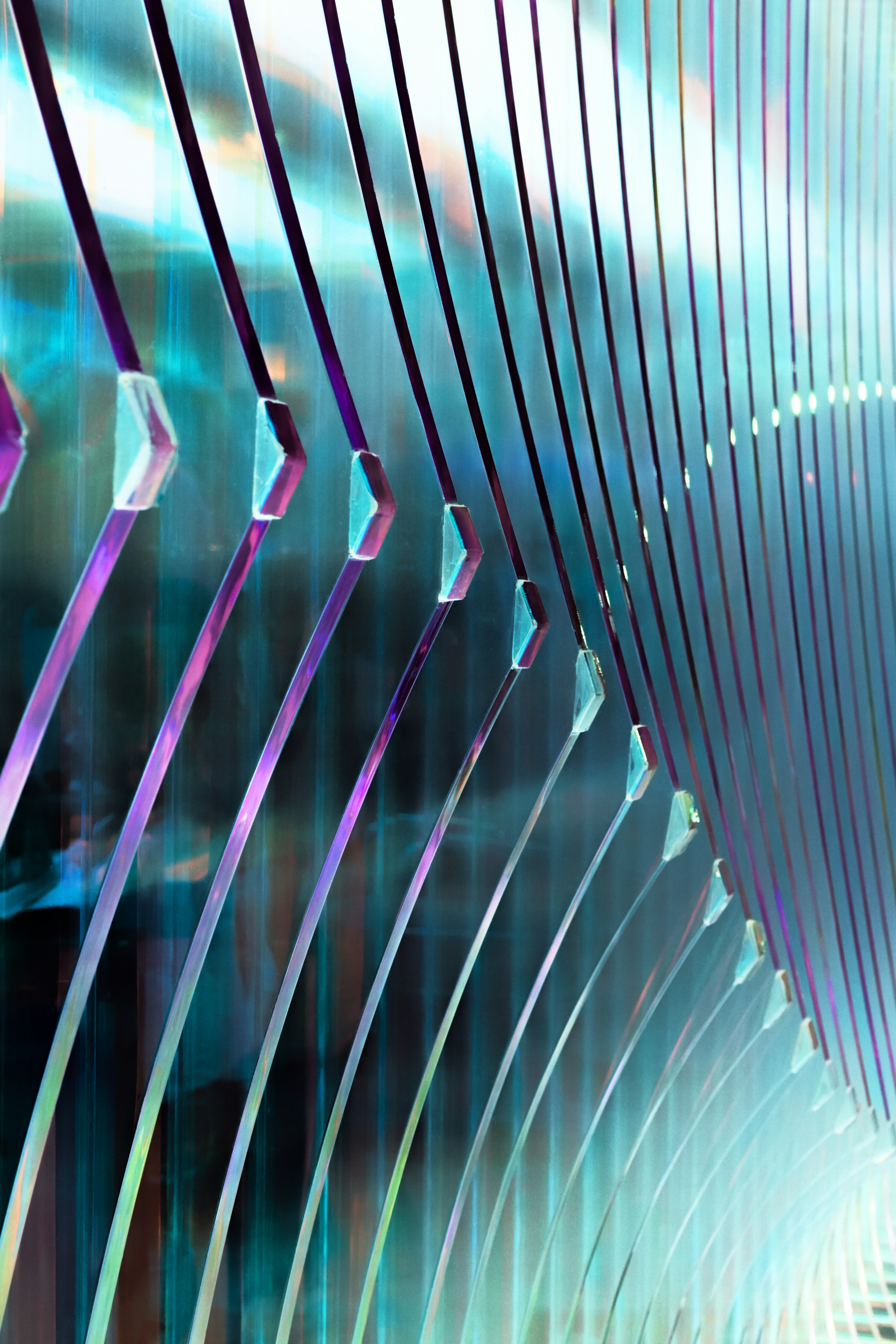 Prismatic Facade: A Cathedral of Glass Struts in Motion