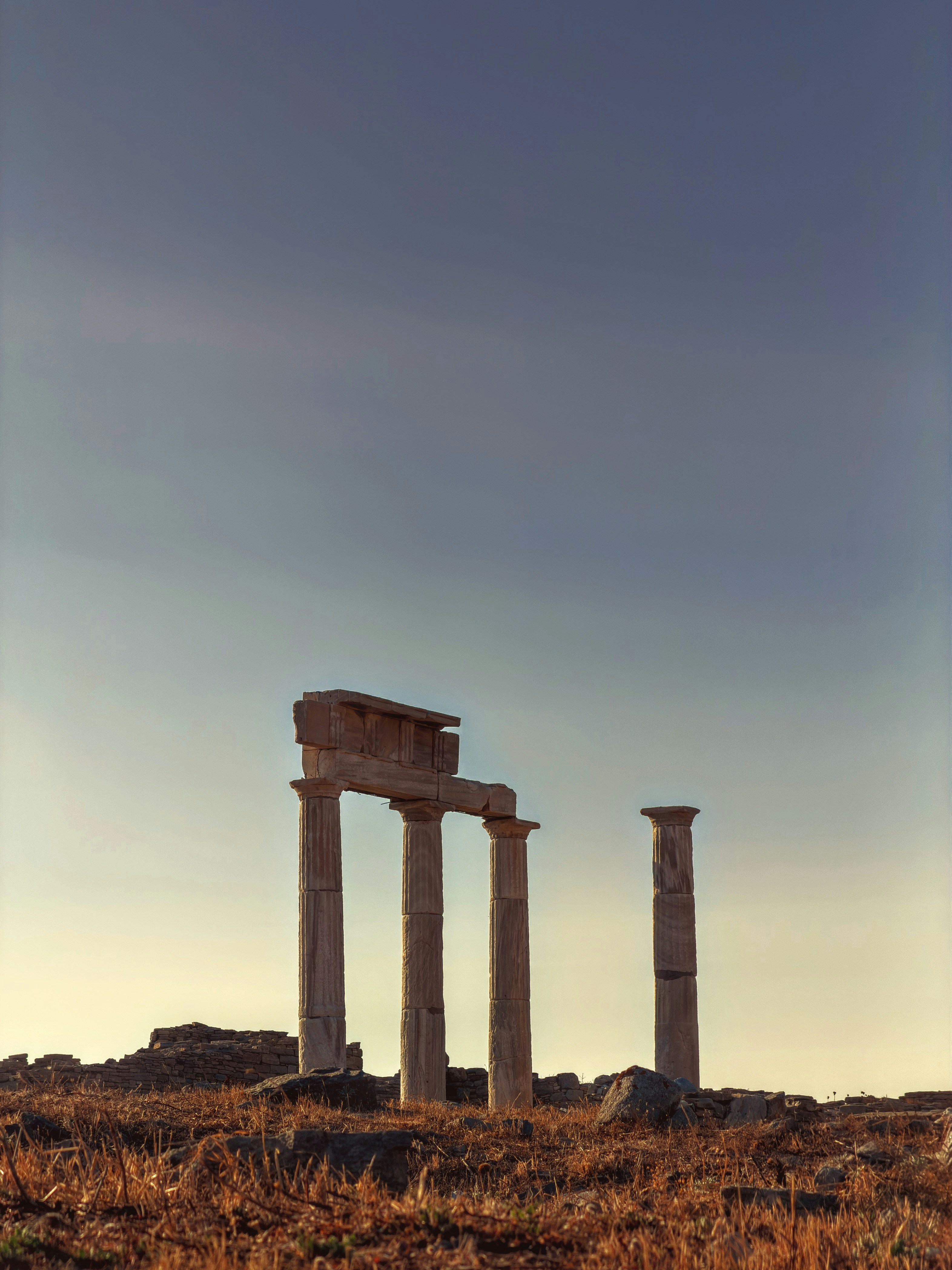 Ancient Gatekeeper: Remnant Columns Against a Wide Open Sky