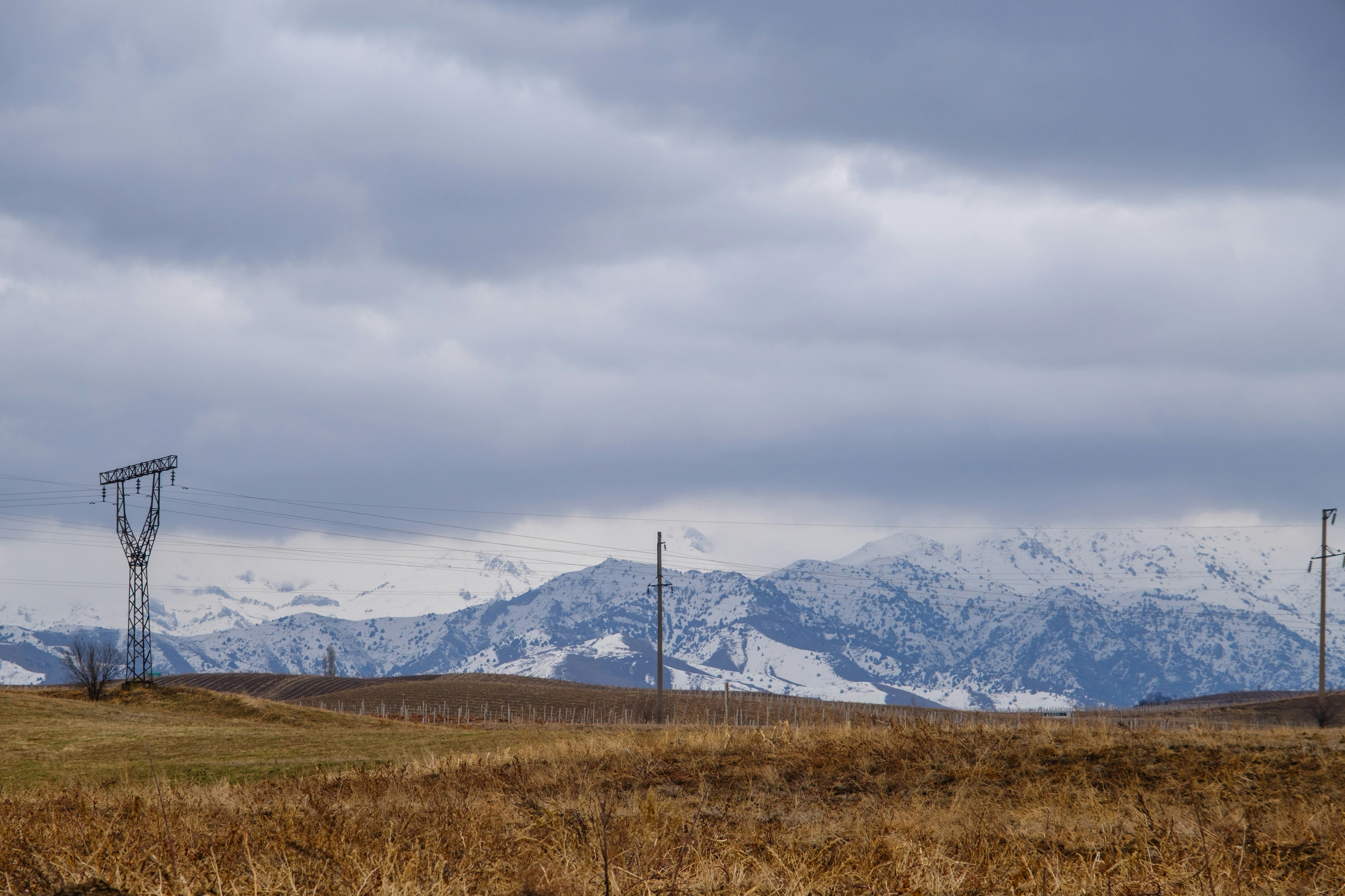 Snow-dusted Peaks on a Quiet Prairie