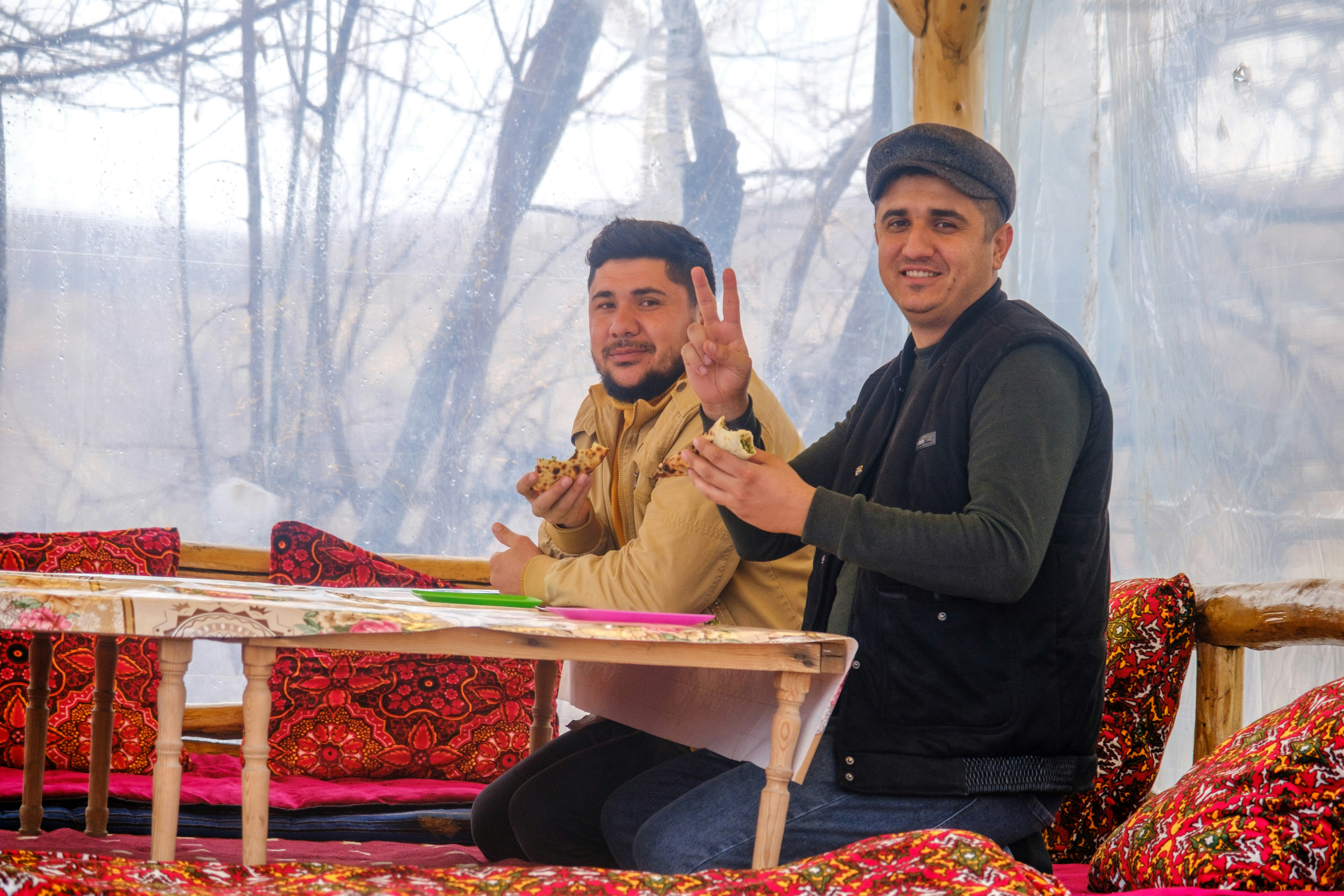 Two Friends at a Colorful Siesta: Peaceful Pause in a Rustic Lounge