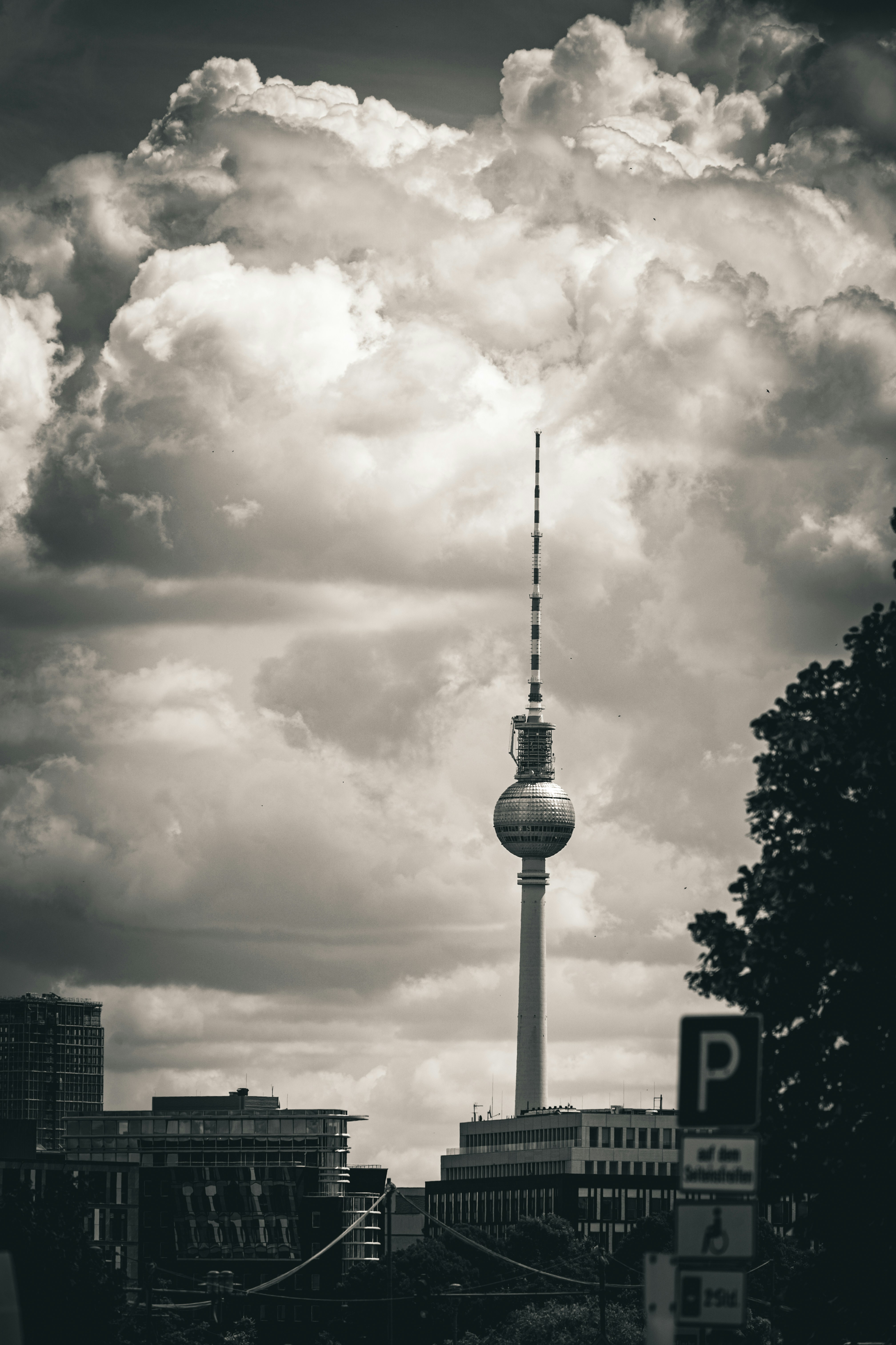 Cloud-sculpted Sky Quietly Framing the Berlin Tower