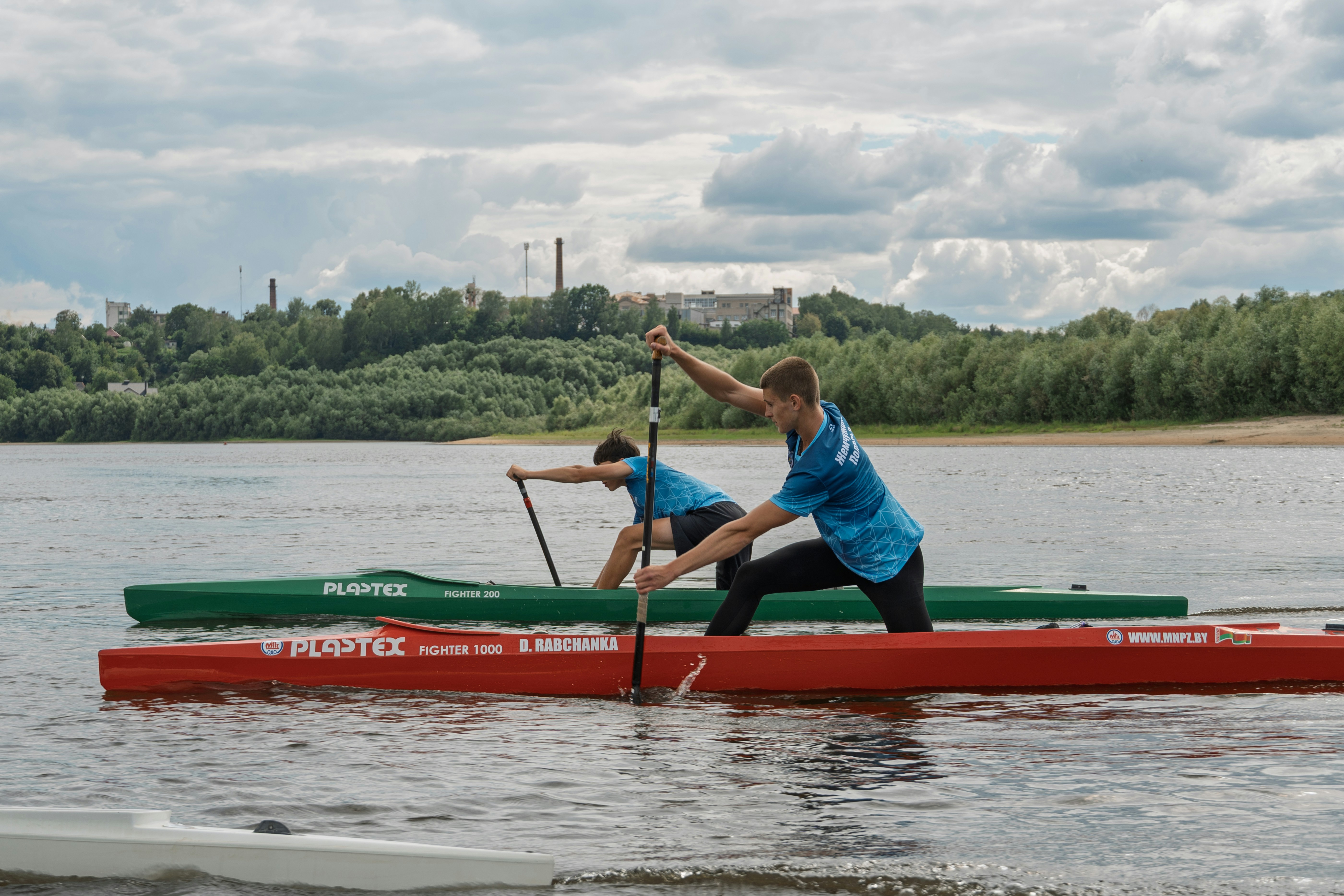 Dueling Paddles: Two-Boat Sprint Across a Quiet Lake