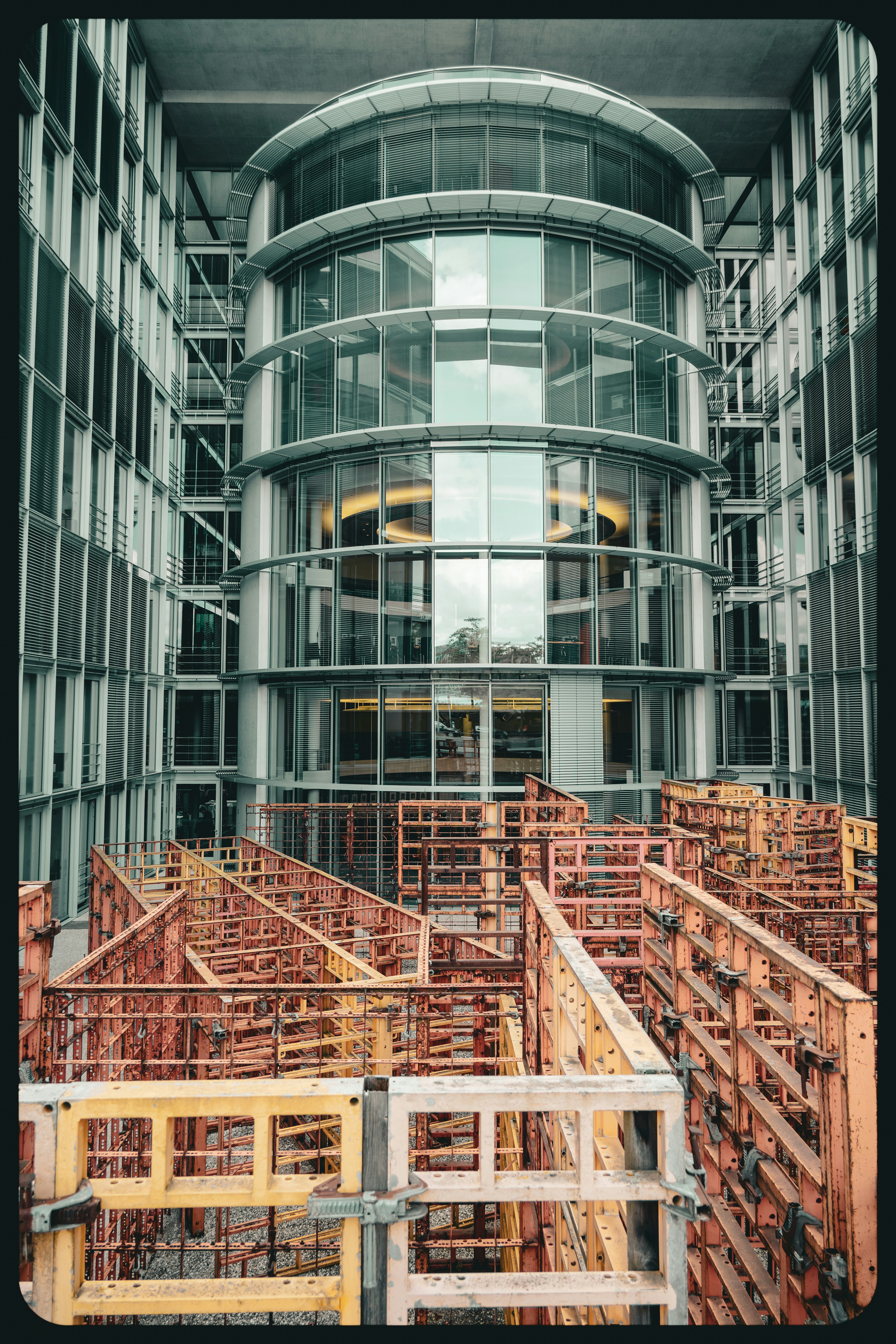 Circular Atrium Rising Above a Construction Framing