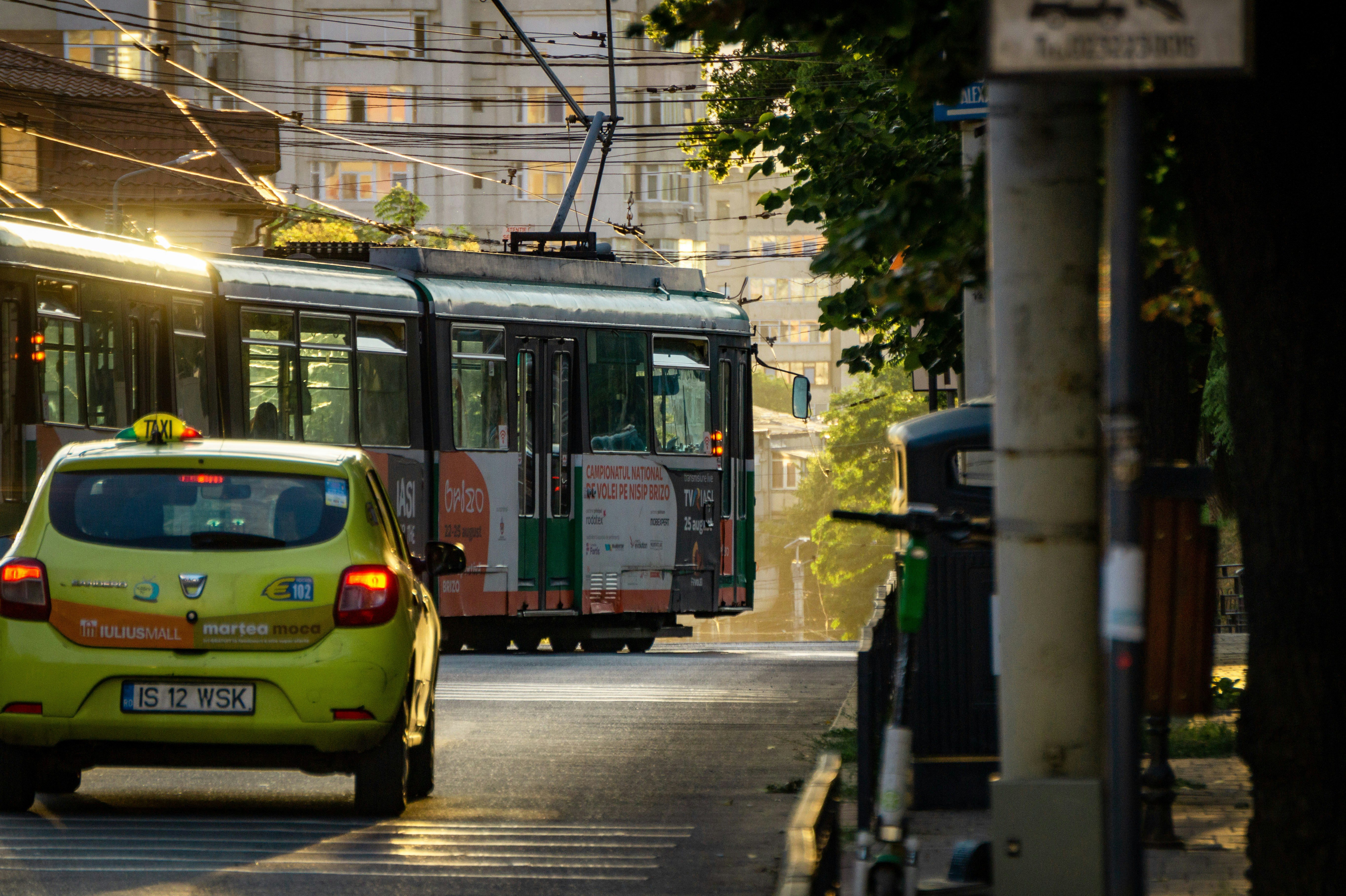 Sunlit Streetcar Chase: A Glimpse of Urban Transit