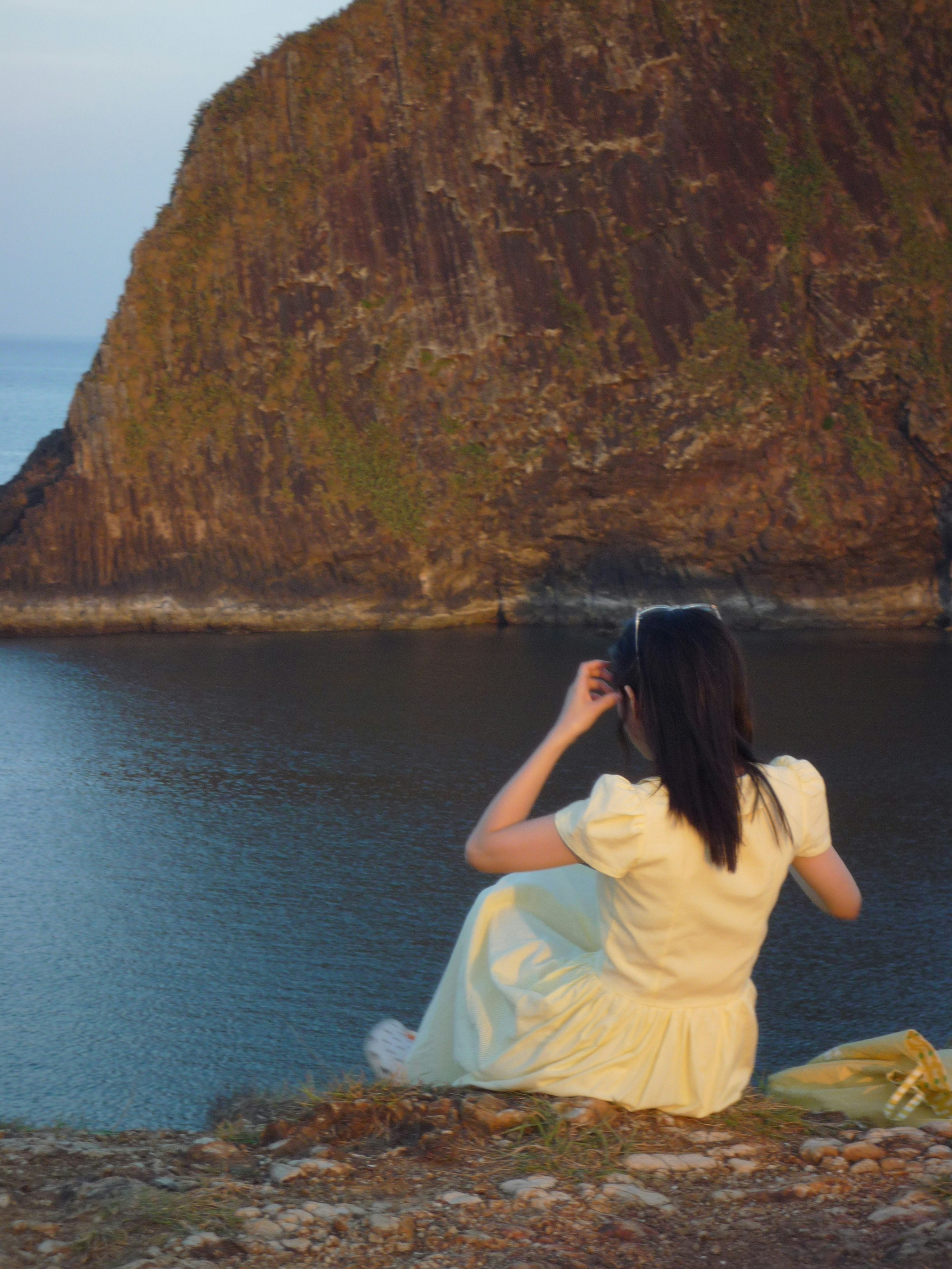 A Quiet Moment by the Cliffside Lake