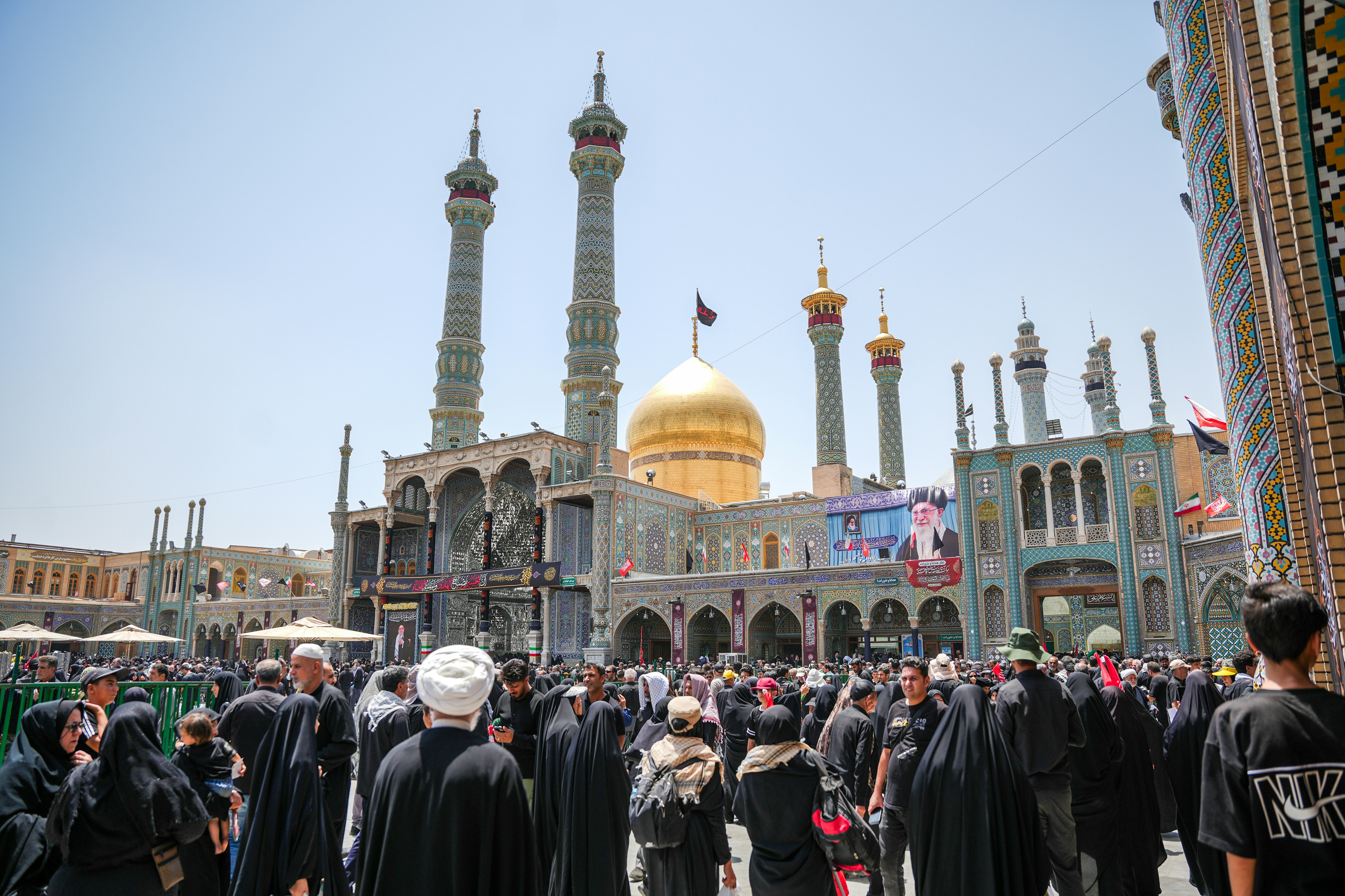 Pilgrims and the Golden Dome: Crowd at Imam Reza Shrine