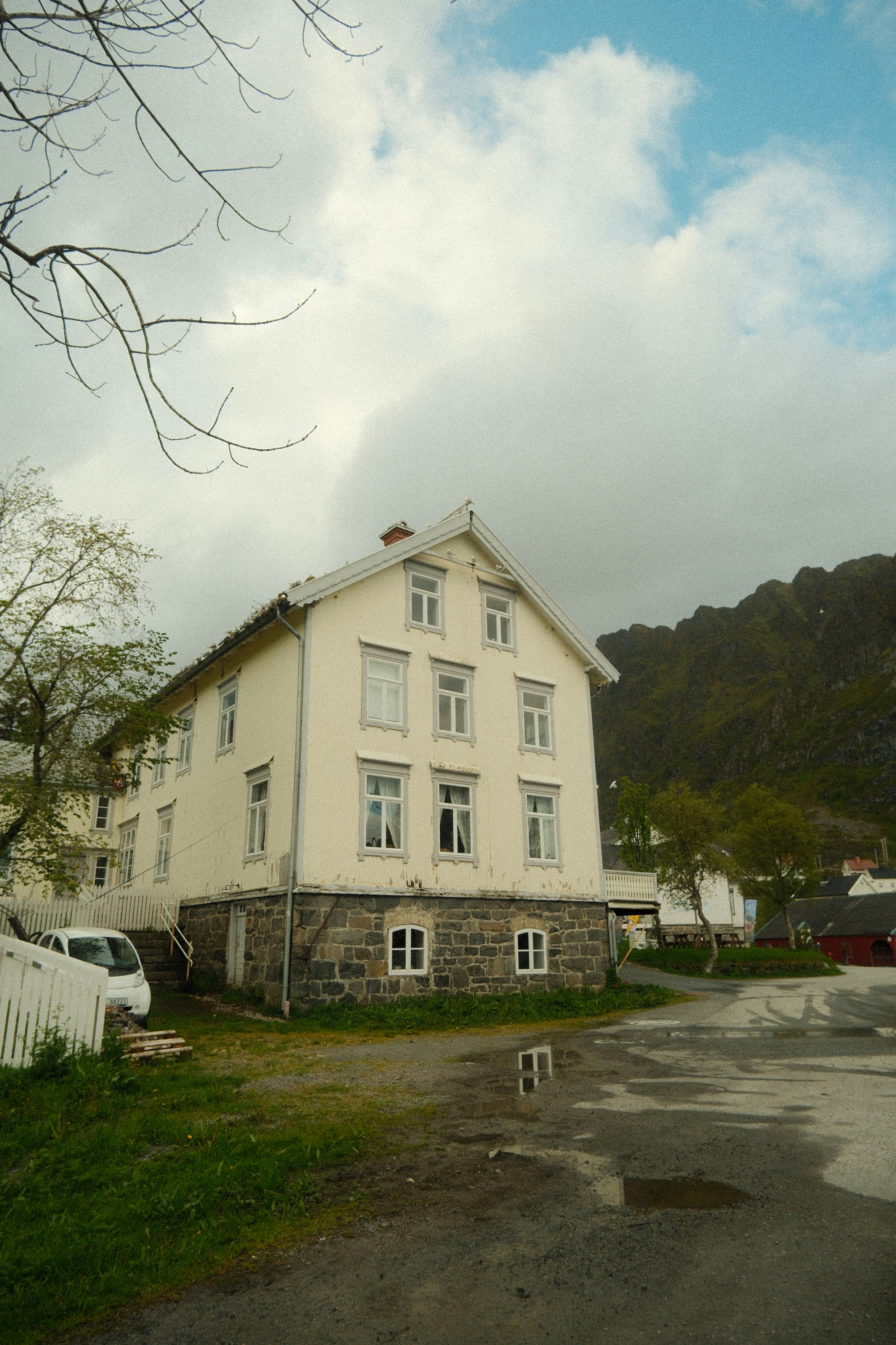 White-stone House on a Quiet Coastal Road