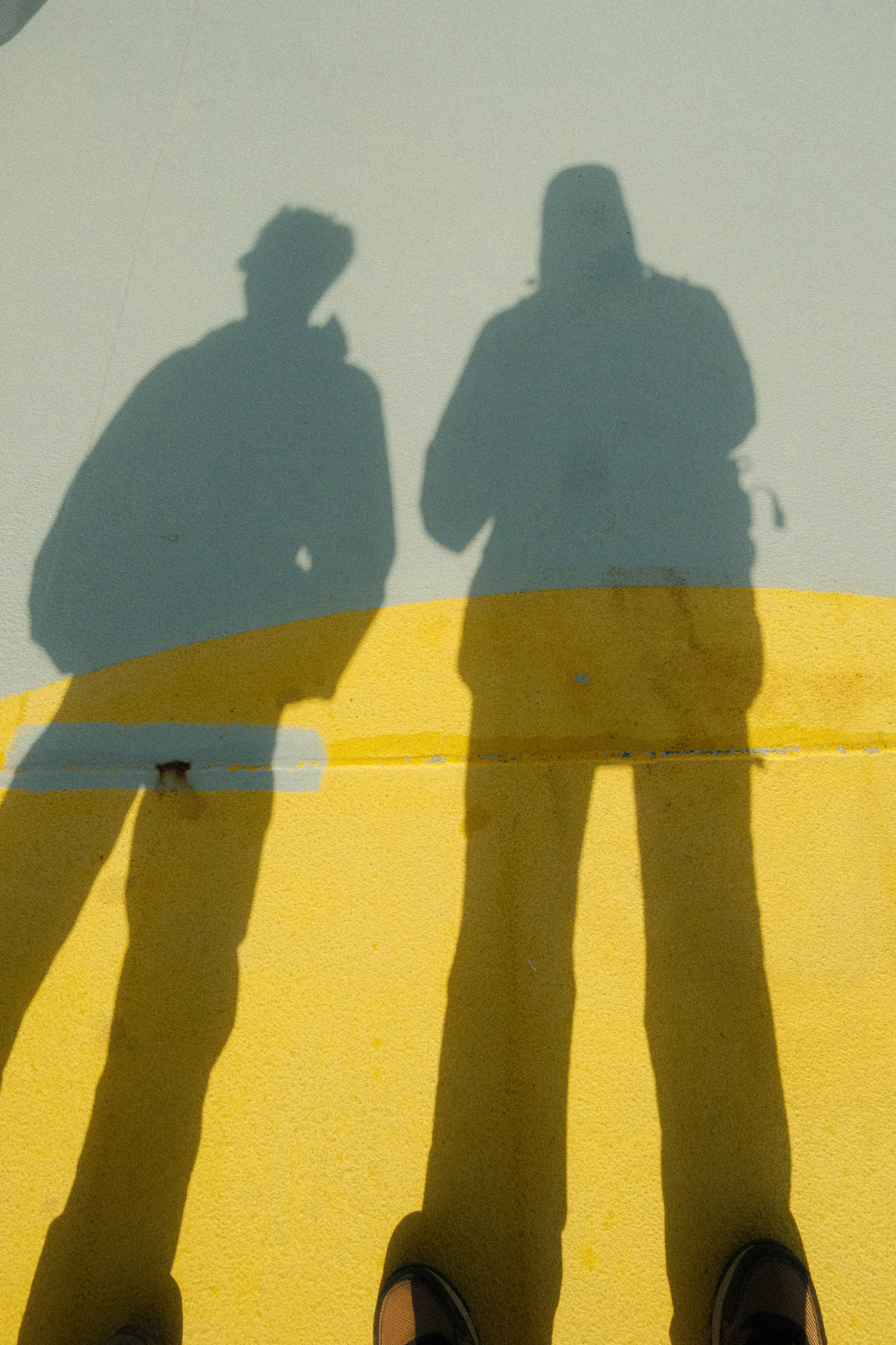 Yellow Wall, Long Shadows: Duo of Hidden Figures