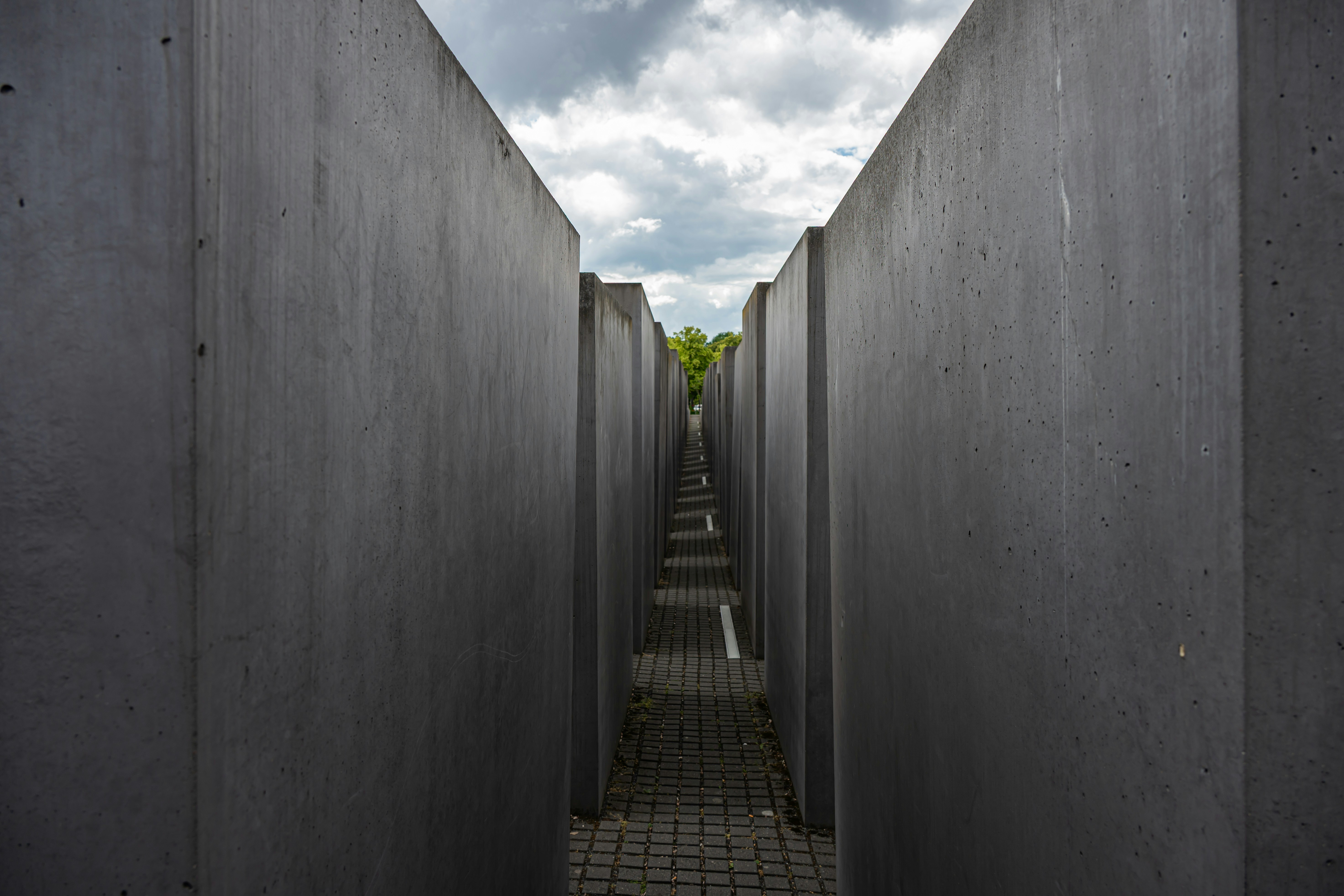 Midnight Passage: Walls Converge Toward a Sliver of Sky