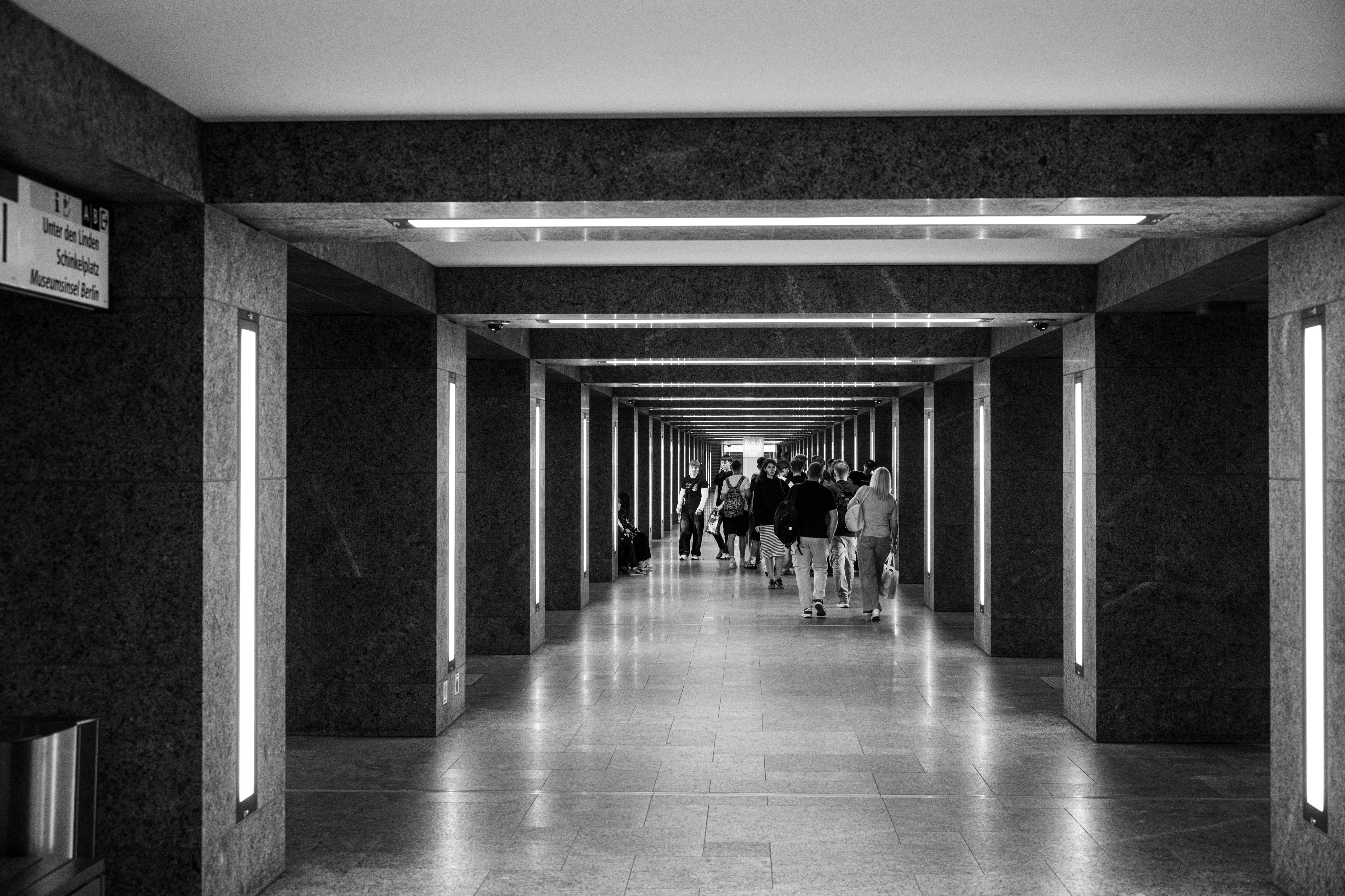 Curtain of Columns: A Monochrome Walk Through the Subway Corridor