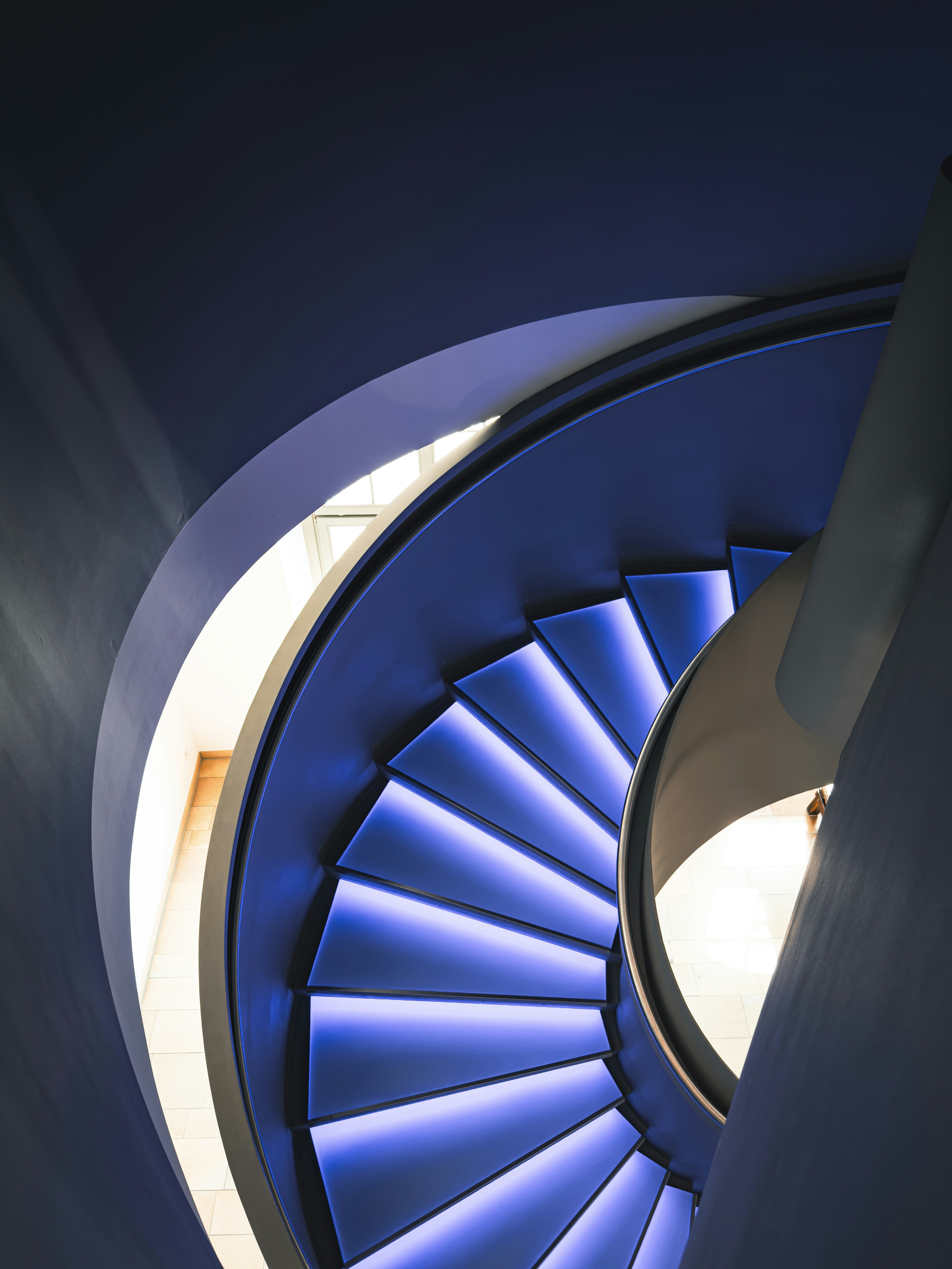 Spiral Blue: A Night-Shift Staircase in Neon Hue