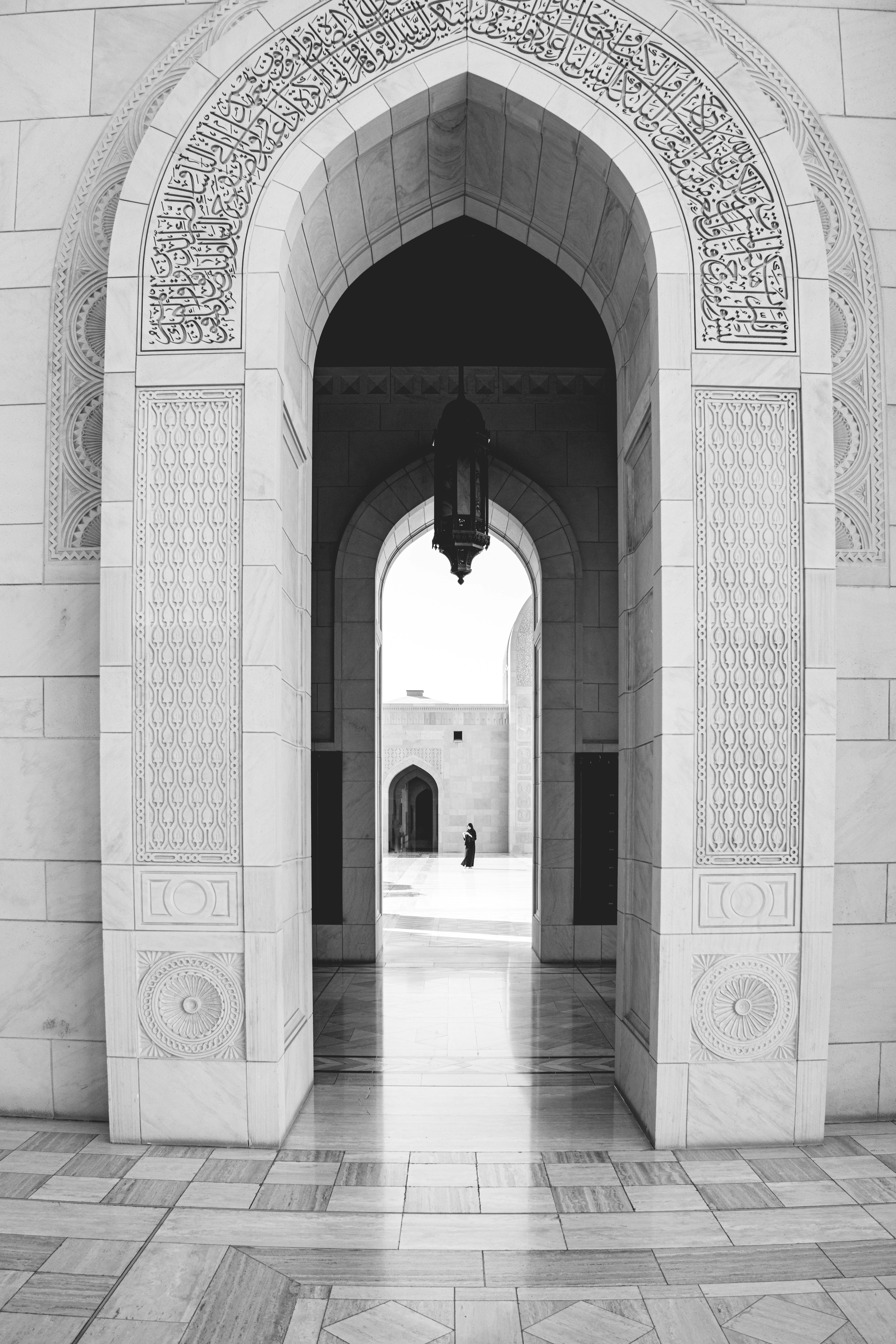 Architectural Portal: Silent Lantern Framed by Marble Arches