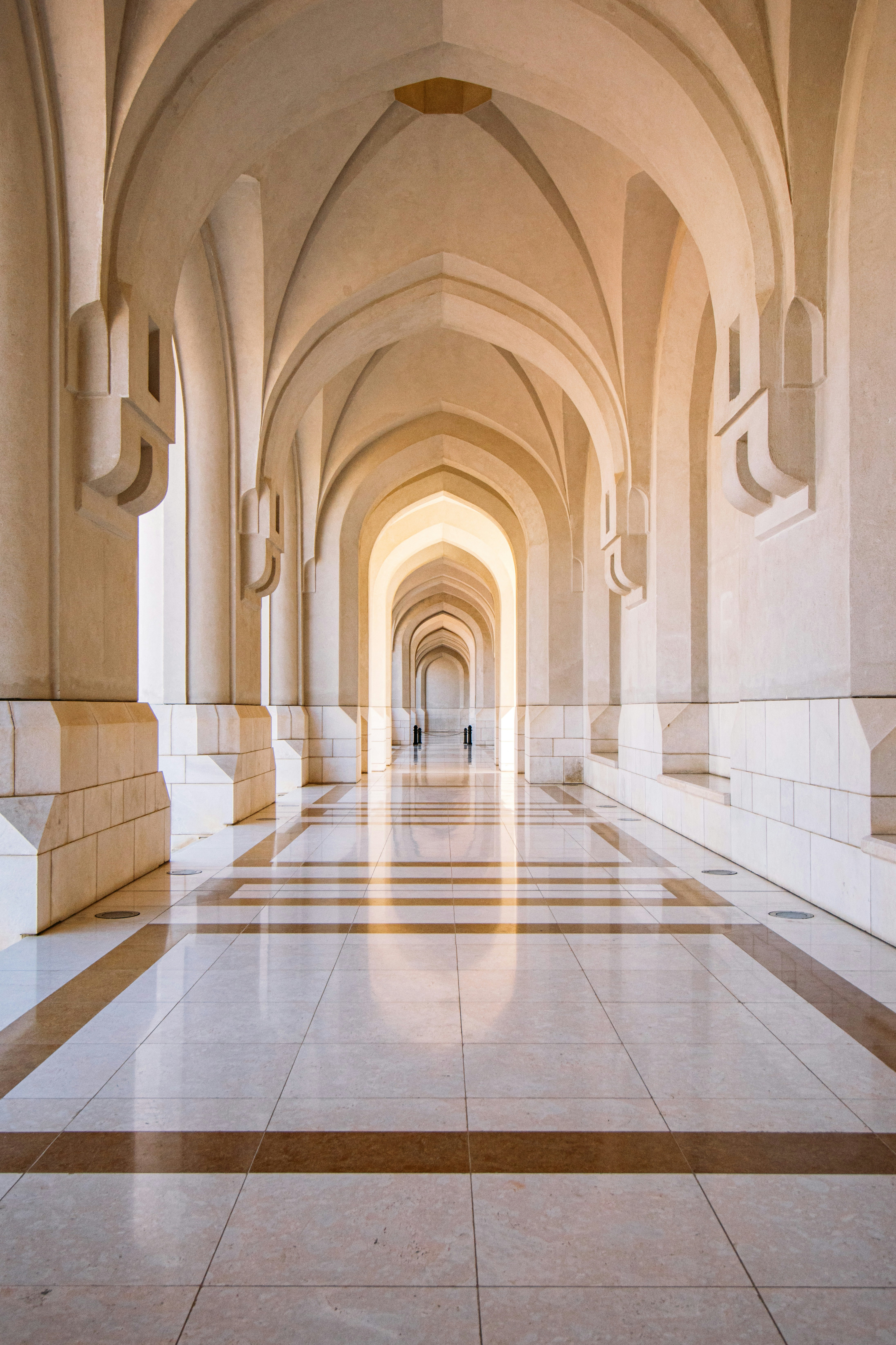 Archway Corridor of Light: Receding Vaults and Marble Terrace