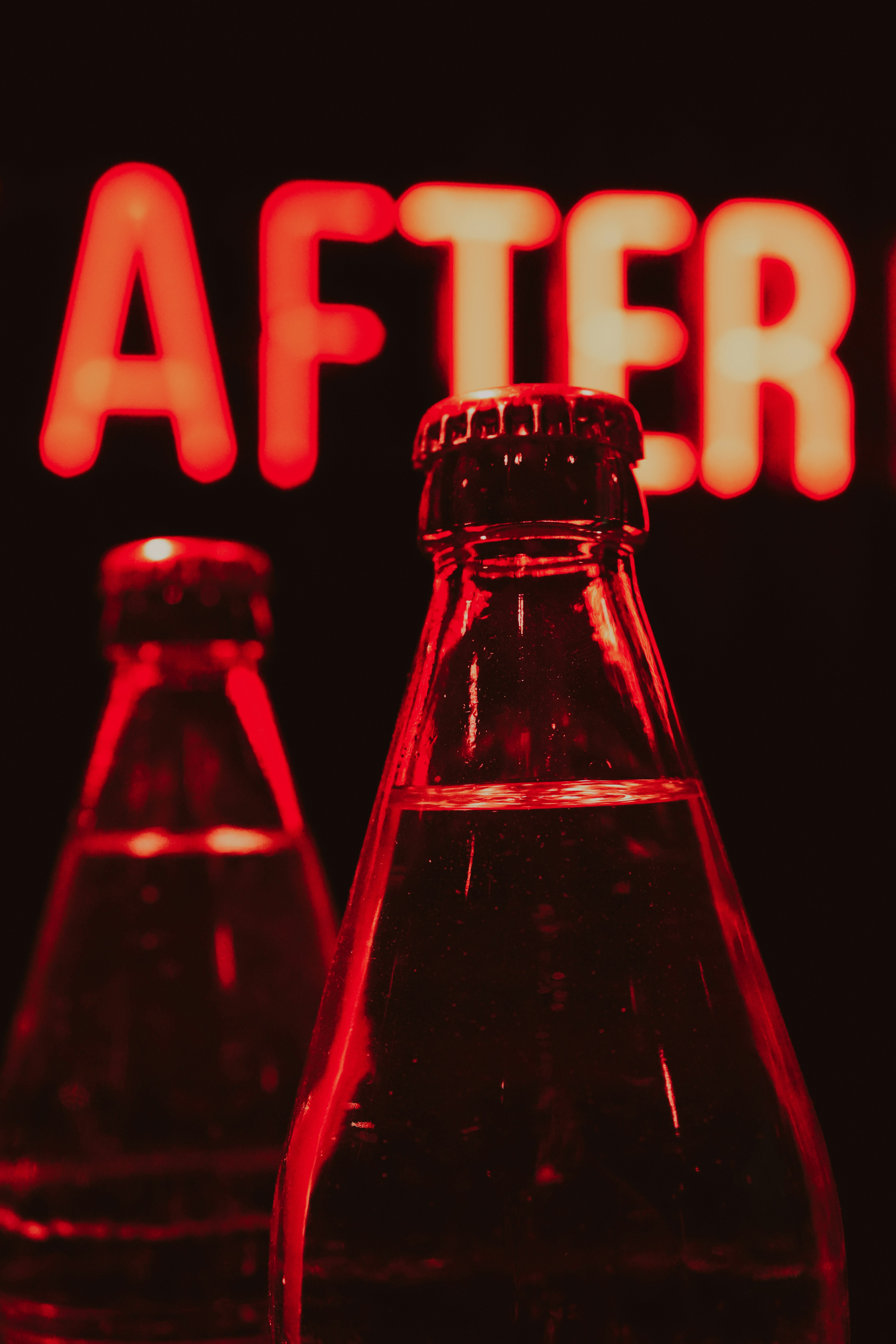 Crimson Bottles under Neon Afterglow