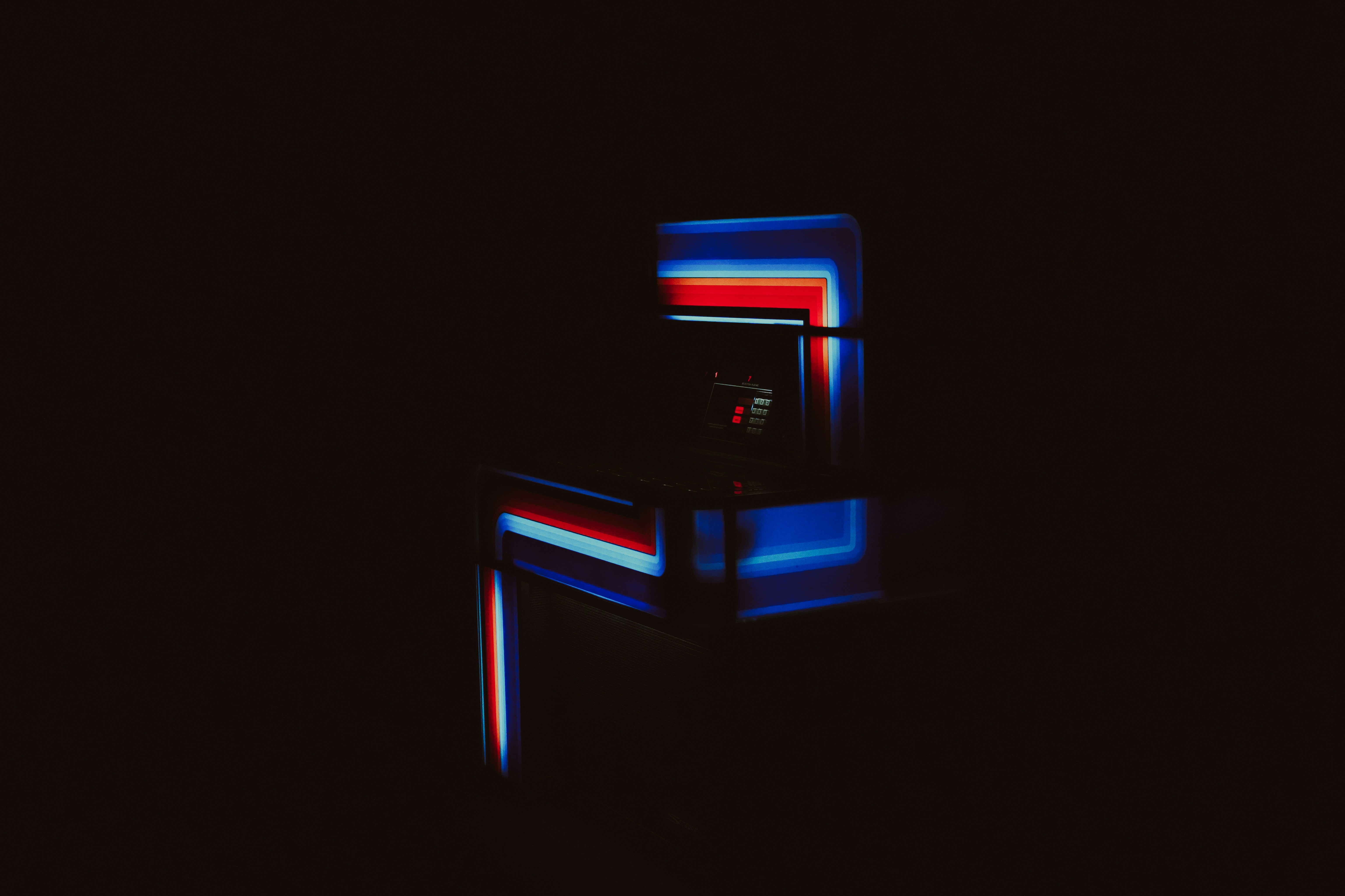Neon Console: Reflections in a Dark Room