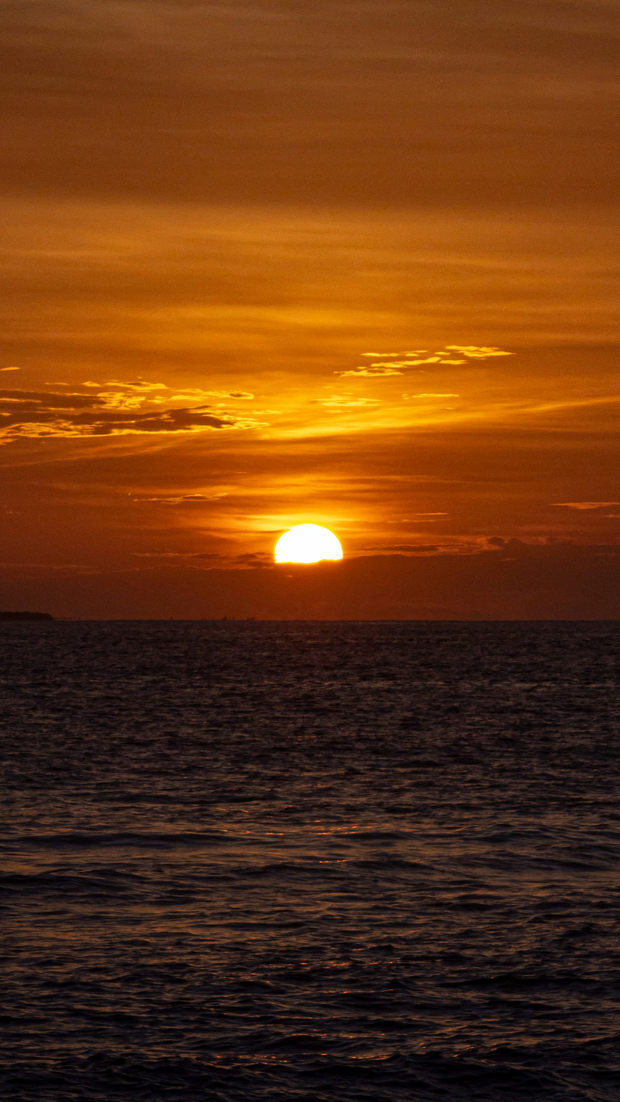 Gilded Horizon: Sun Kissed Sea at Dusk