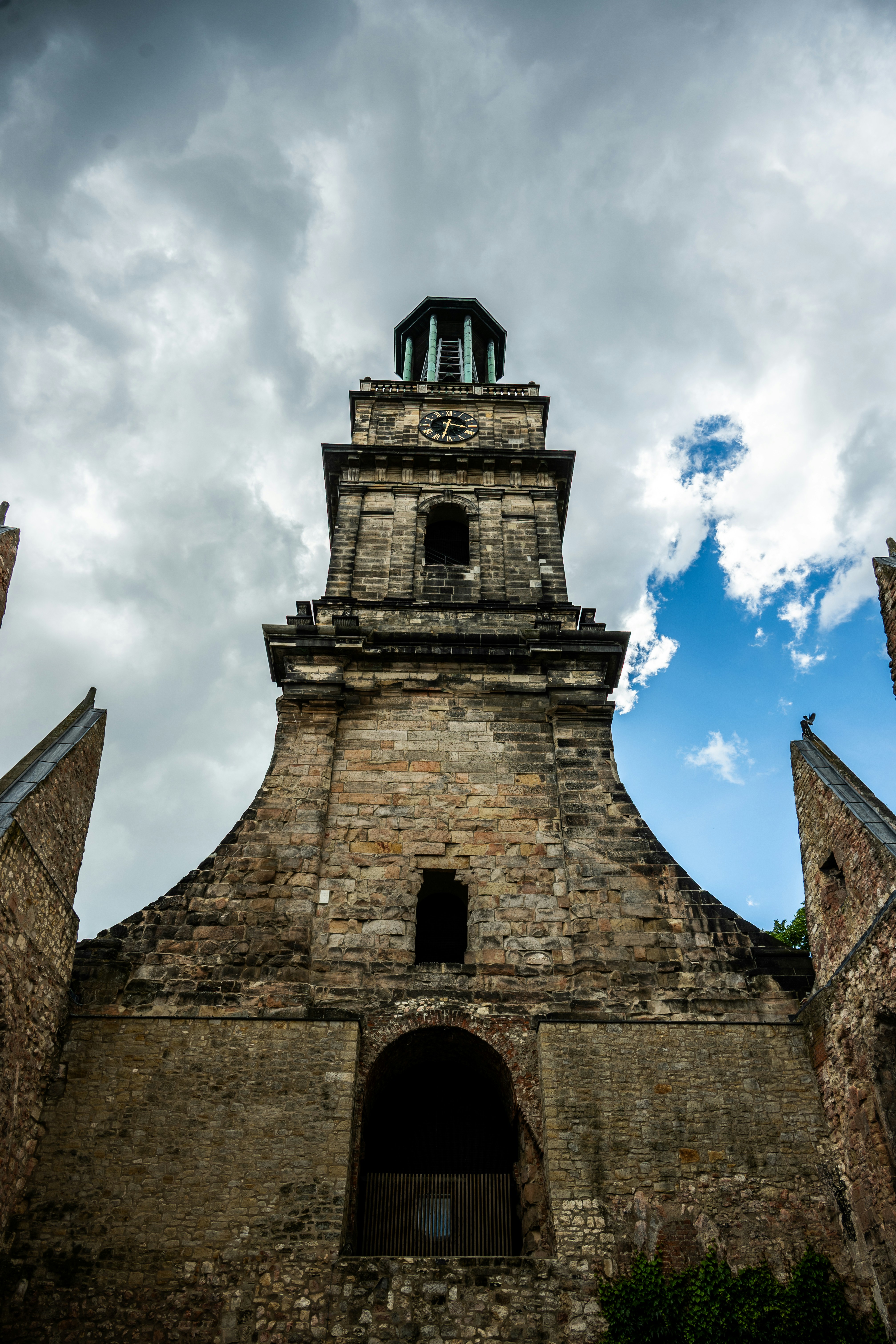 Stone Clock Tower Reaching into a Stormy Sky