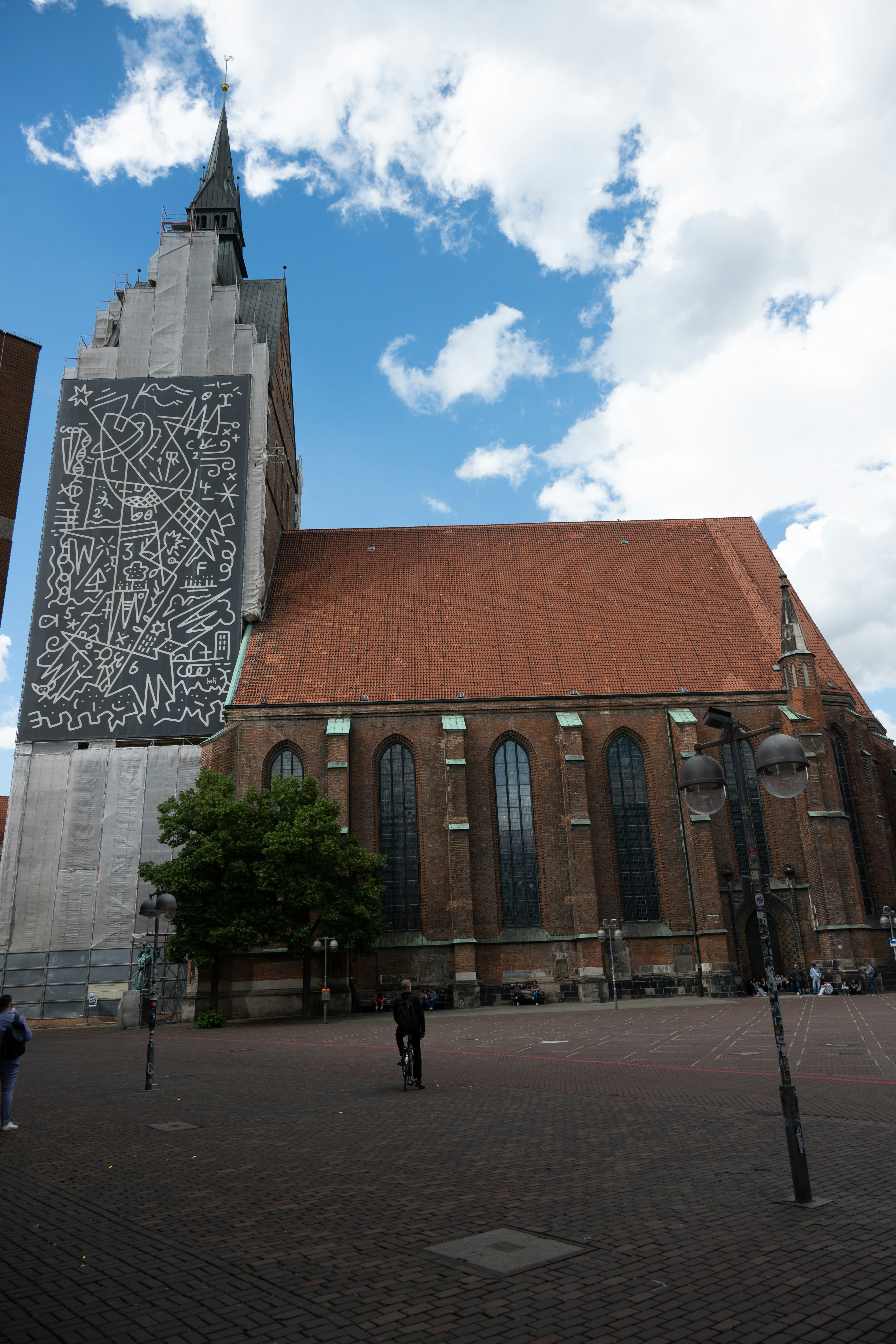 Urban Cathedral: A Brick Edifice with A Modern Banner of Graffiti