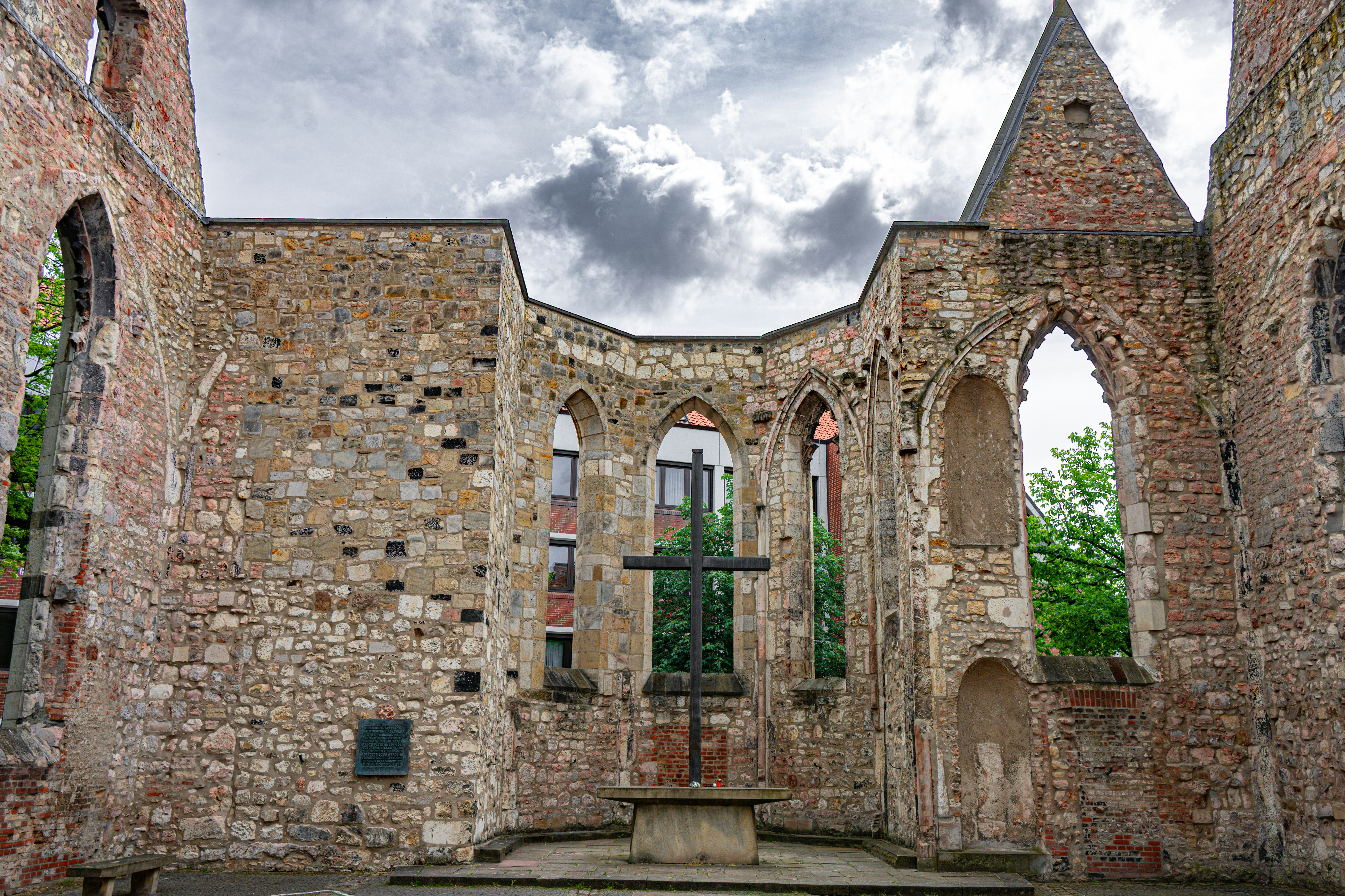 Ruined Abbey Courtyard Framed by Arched Windows and Sky