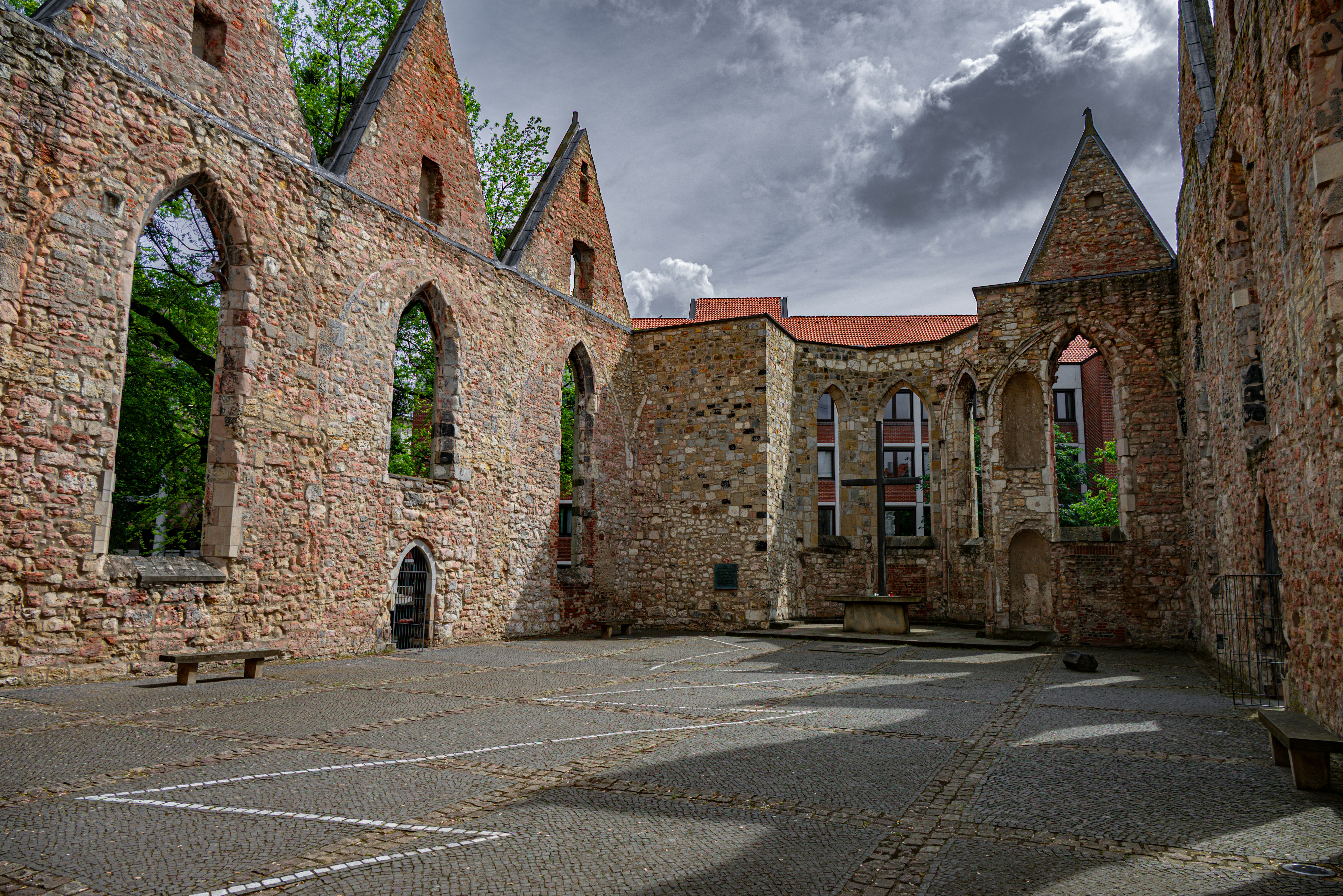 Ruined Abbey Courtyard under a Striated Sky