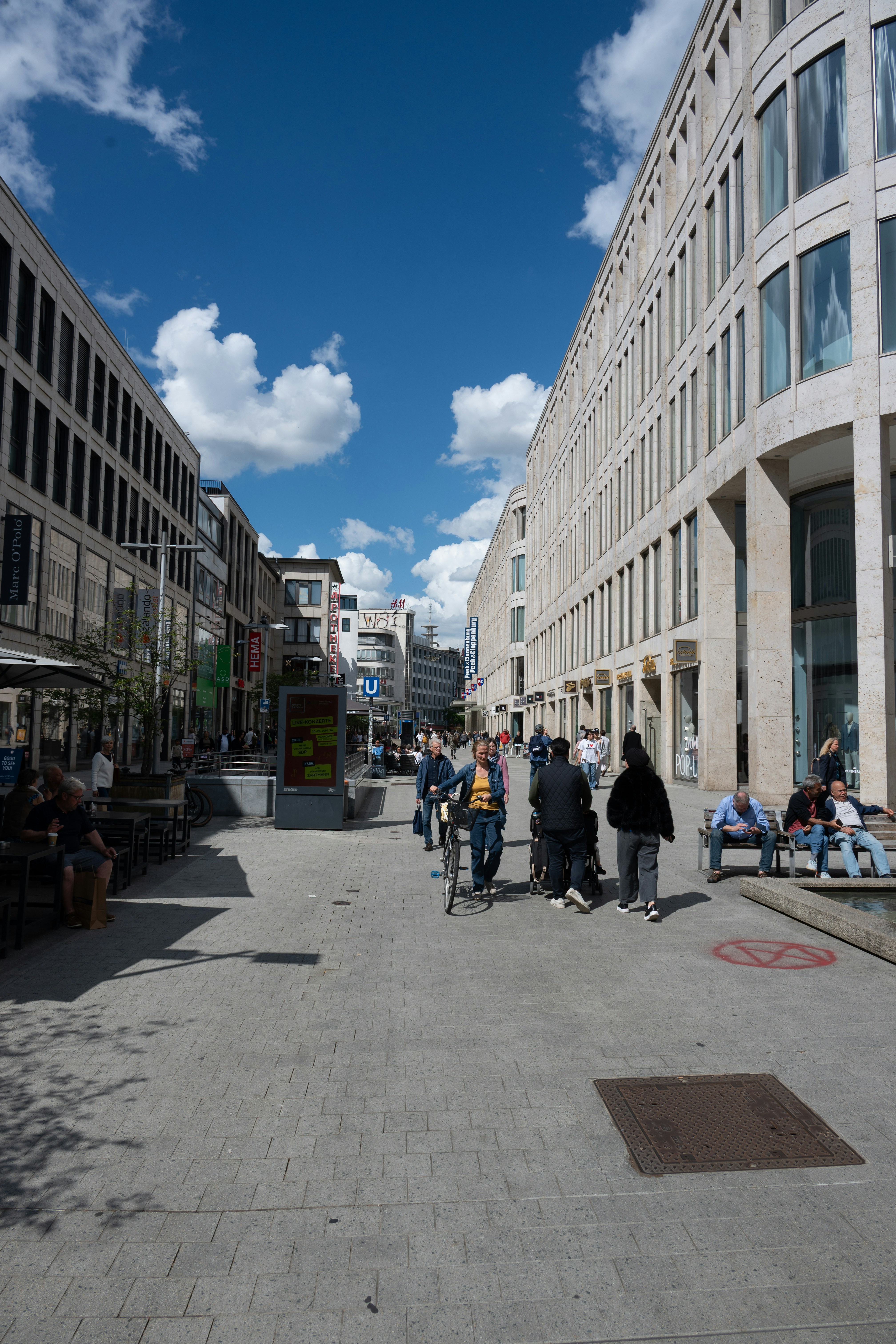 Urban Pulse: Pedestrians and Cyclists in a Modern City Canyon