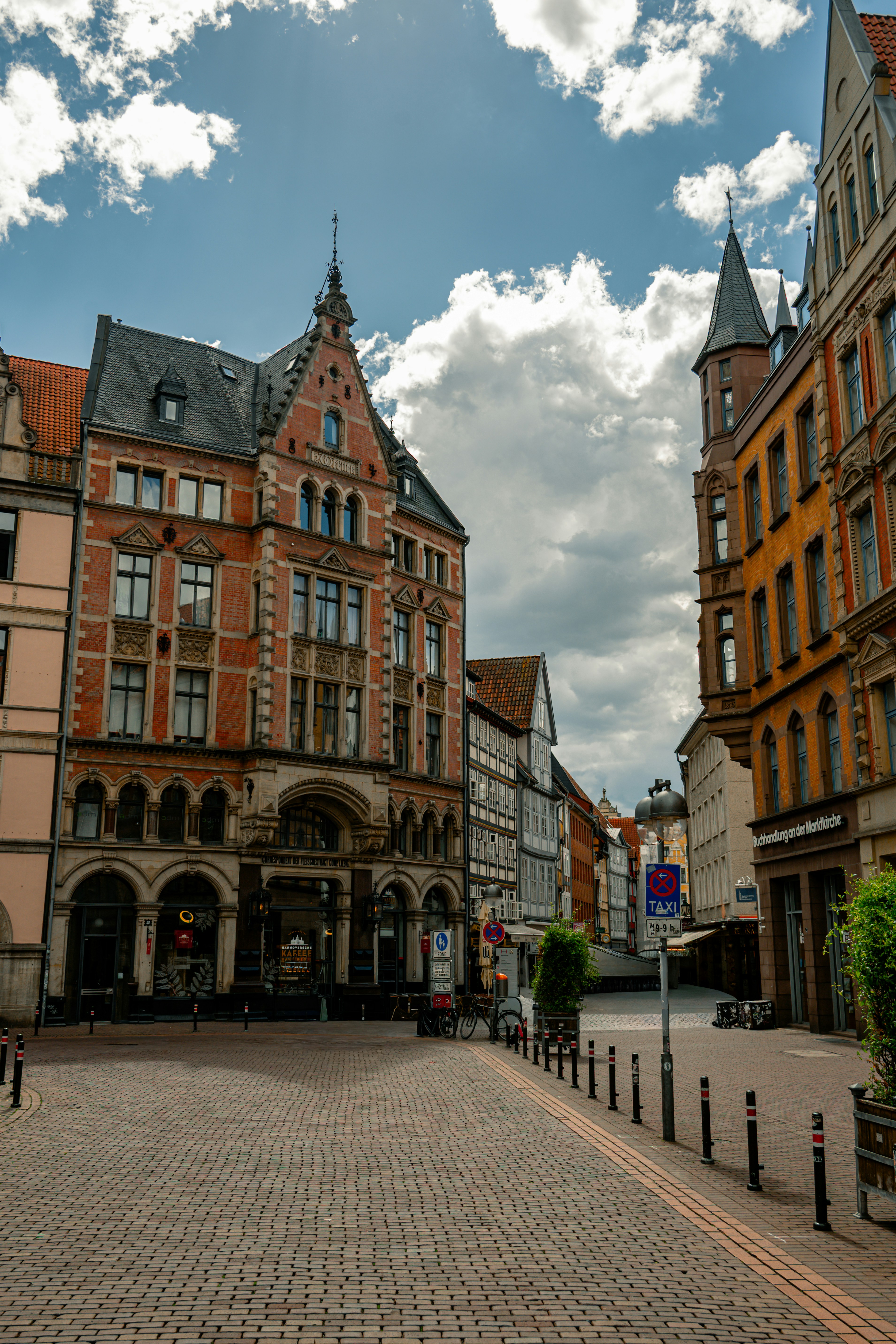 Corner of History: A Cobblestone Street Framed by Timeless Facades