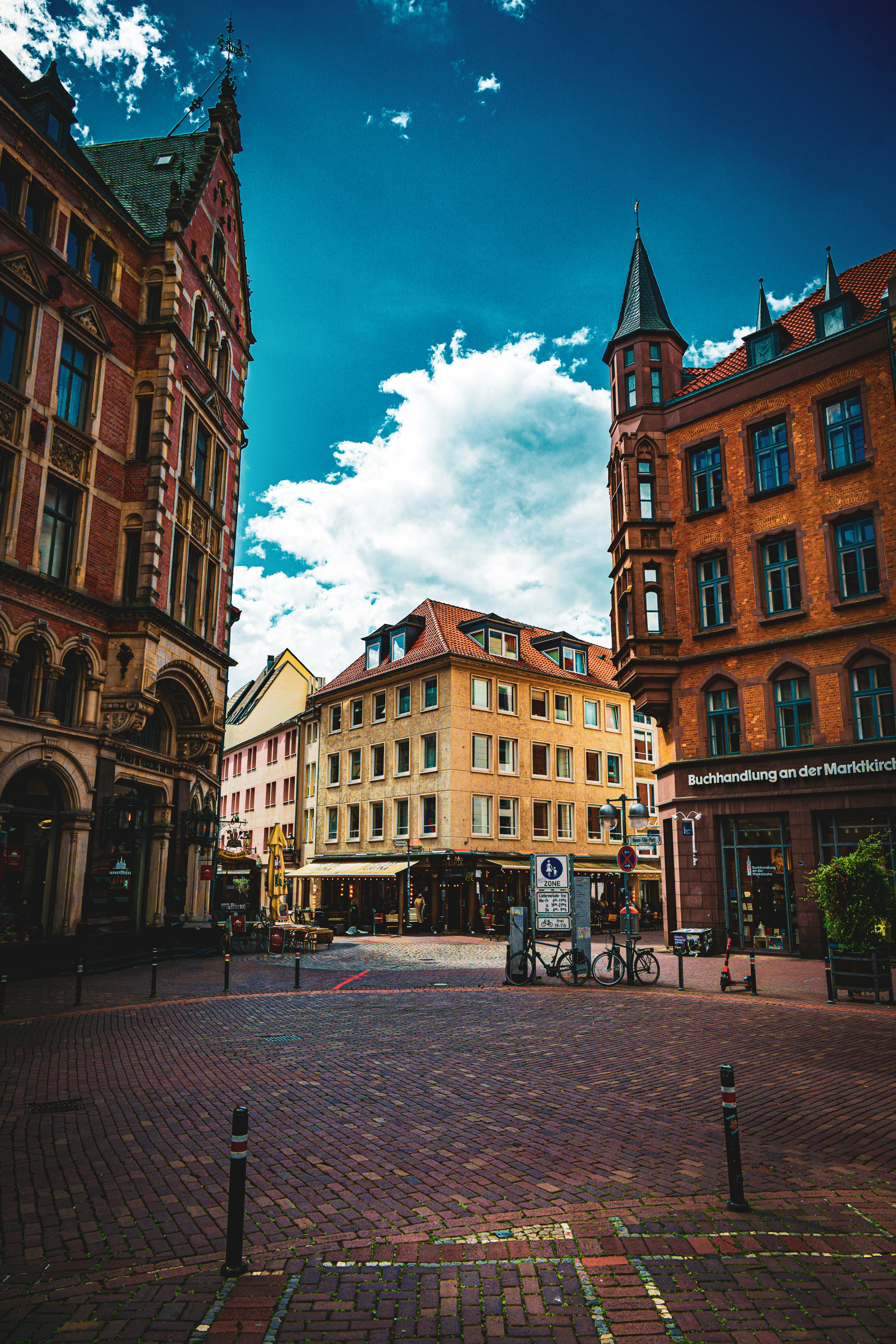 Cobbled Court at Dusk: A European Street Scene Framed by Historic Facades